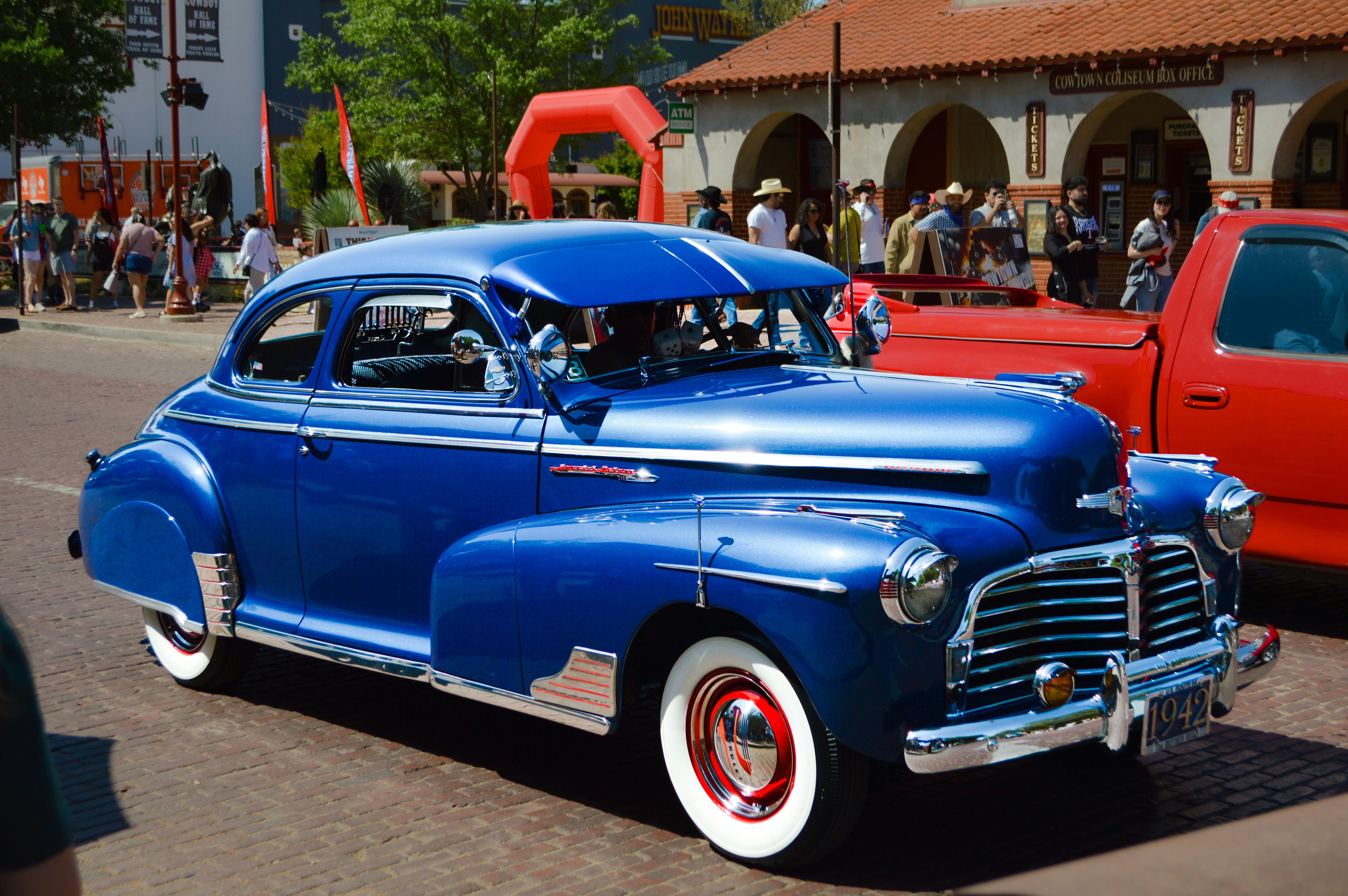 A Pristine Blue Classic: Chromed Nostalgia in the Town Square