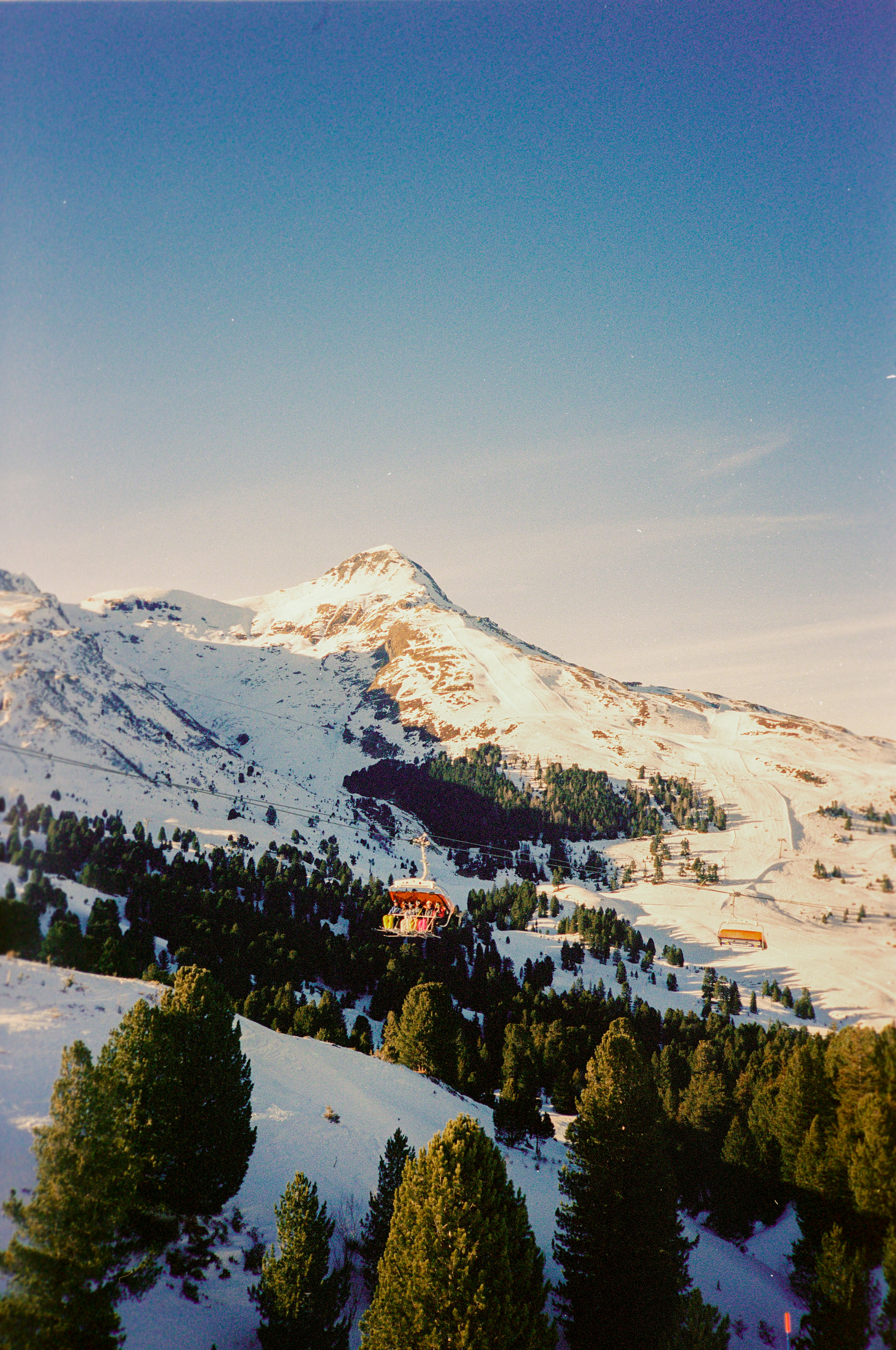 Snowbound Summit with a Cable Car Ascent