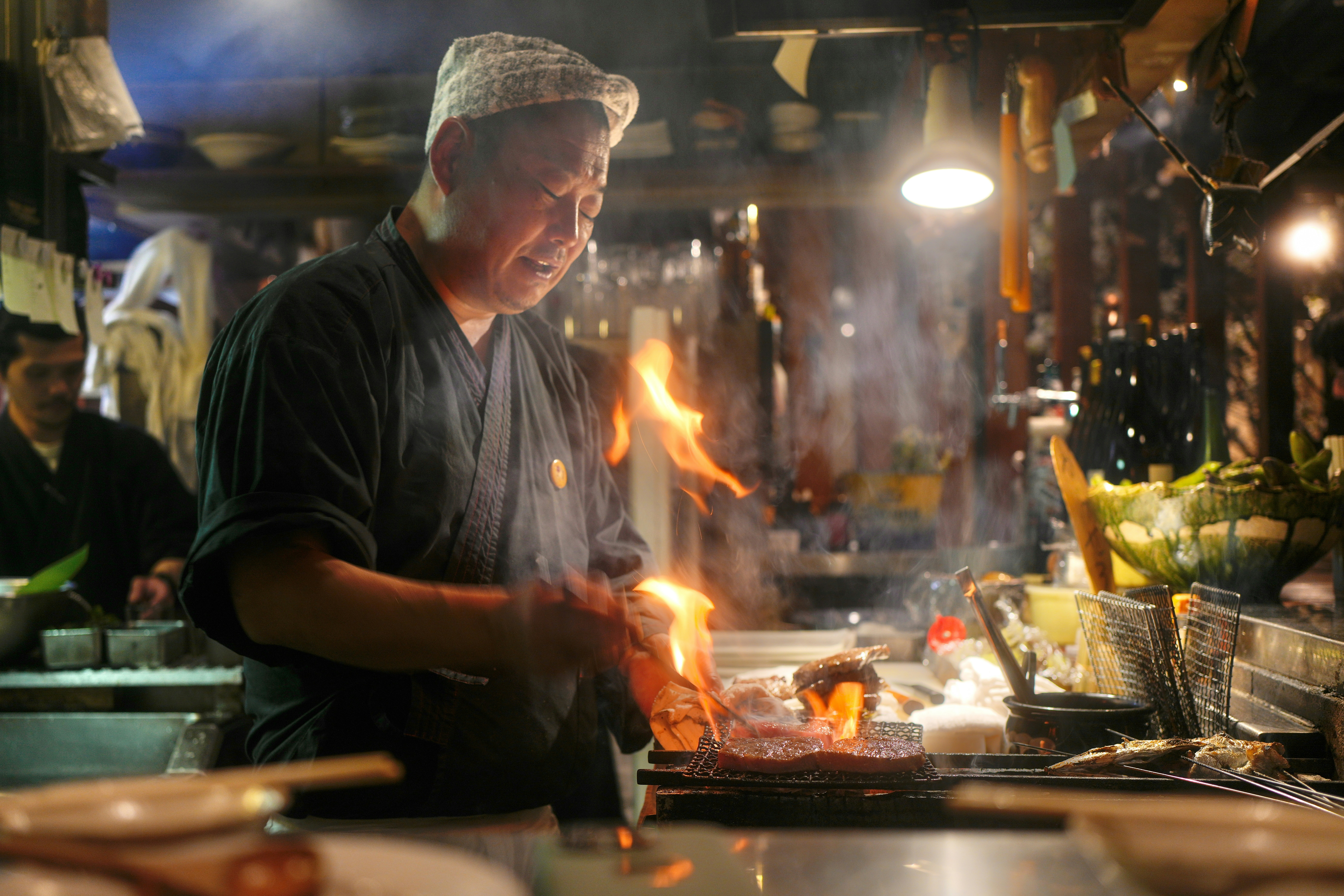 Flame-kissed Chef: Crafting Bathos into Sizzle at a Street Grill
