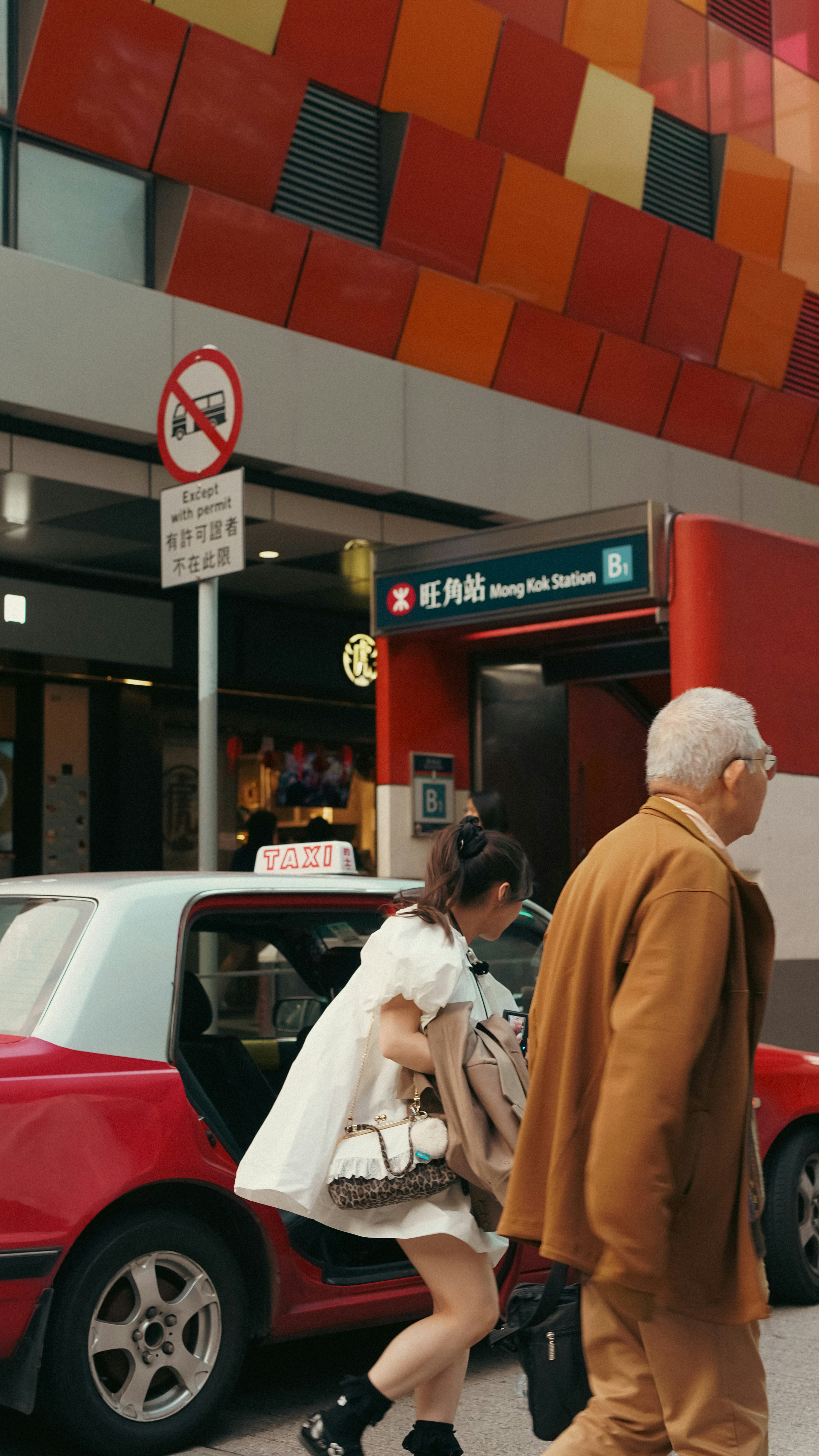 Urban Crossing: A Glimpse of Motion by the Taxi Stand