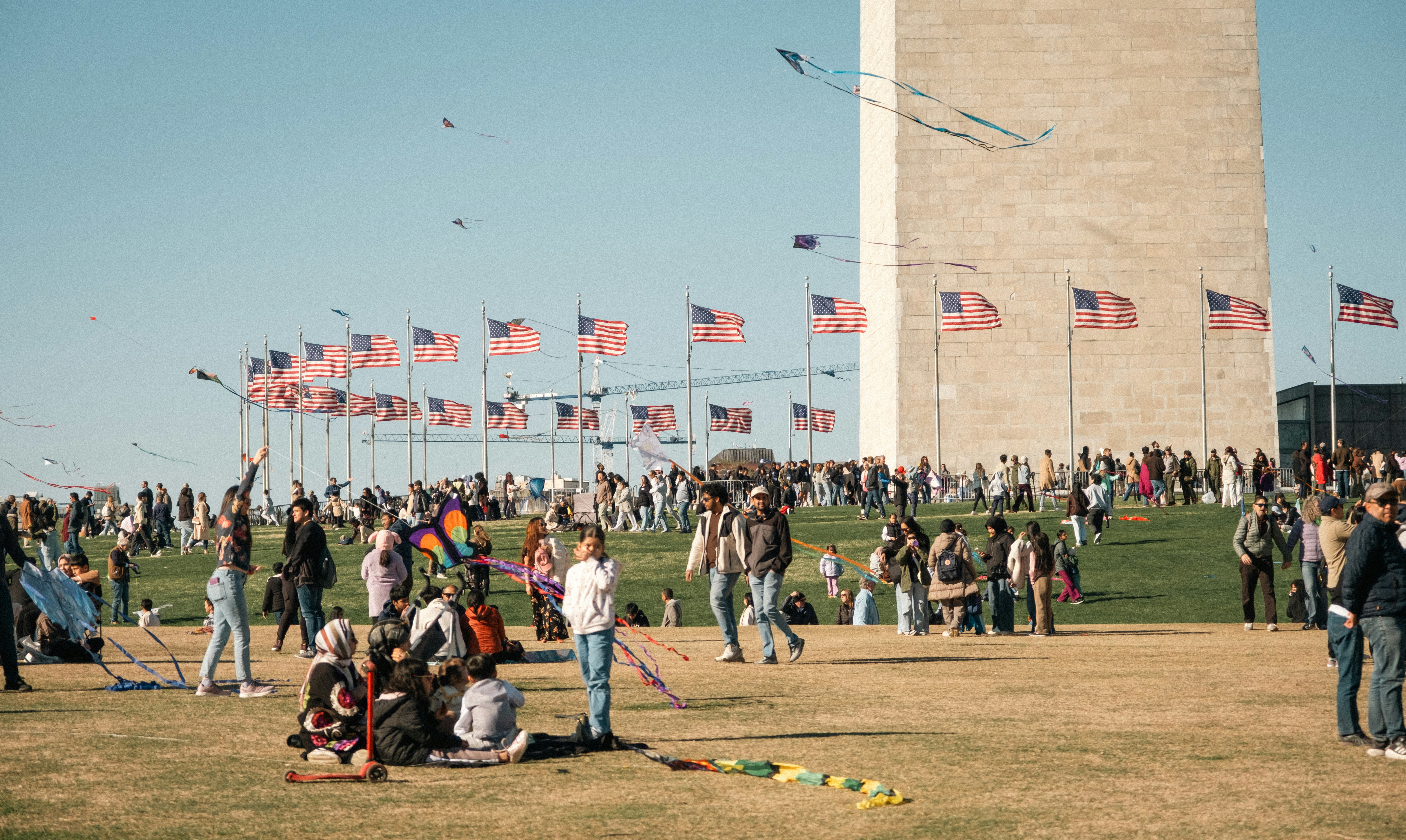 Flags of unity at a sunlit monument park