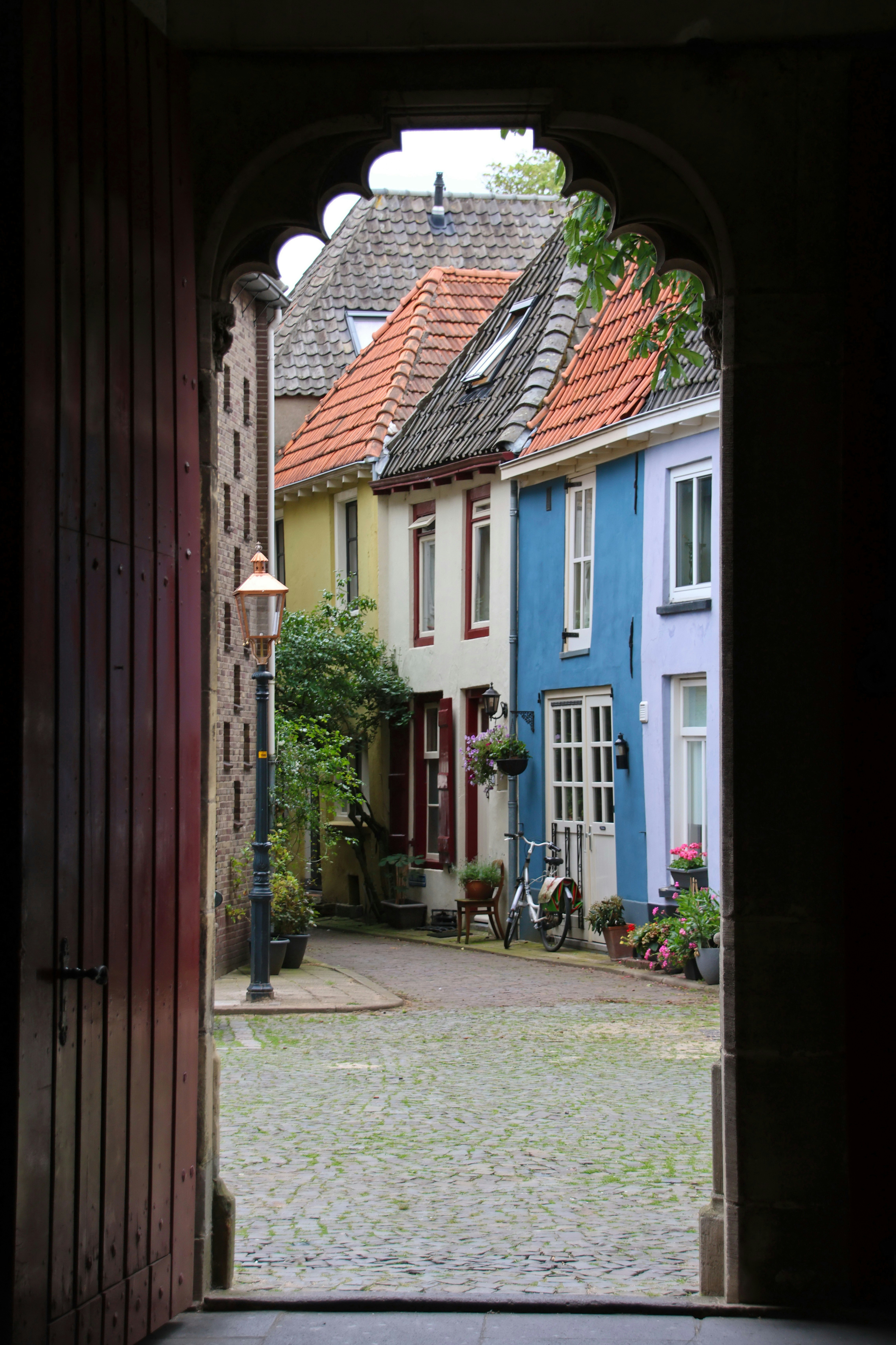 Colorful Street Framed by a Historic Archway