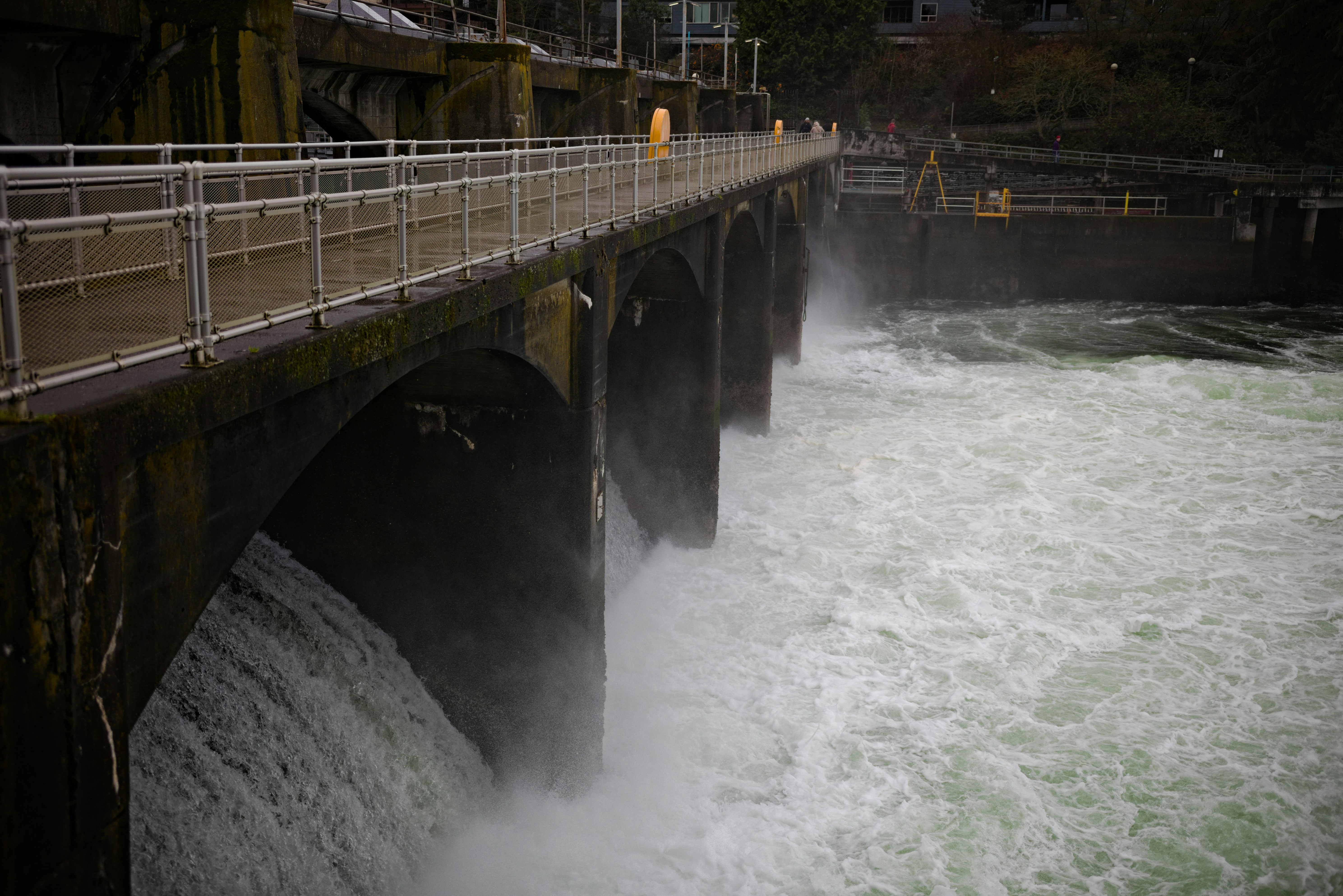 Waterfall Gate: Concrete Arch and Swift Veil of Mist