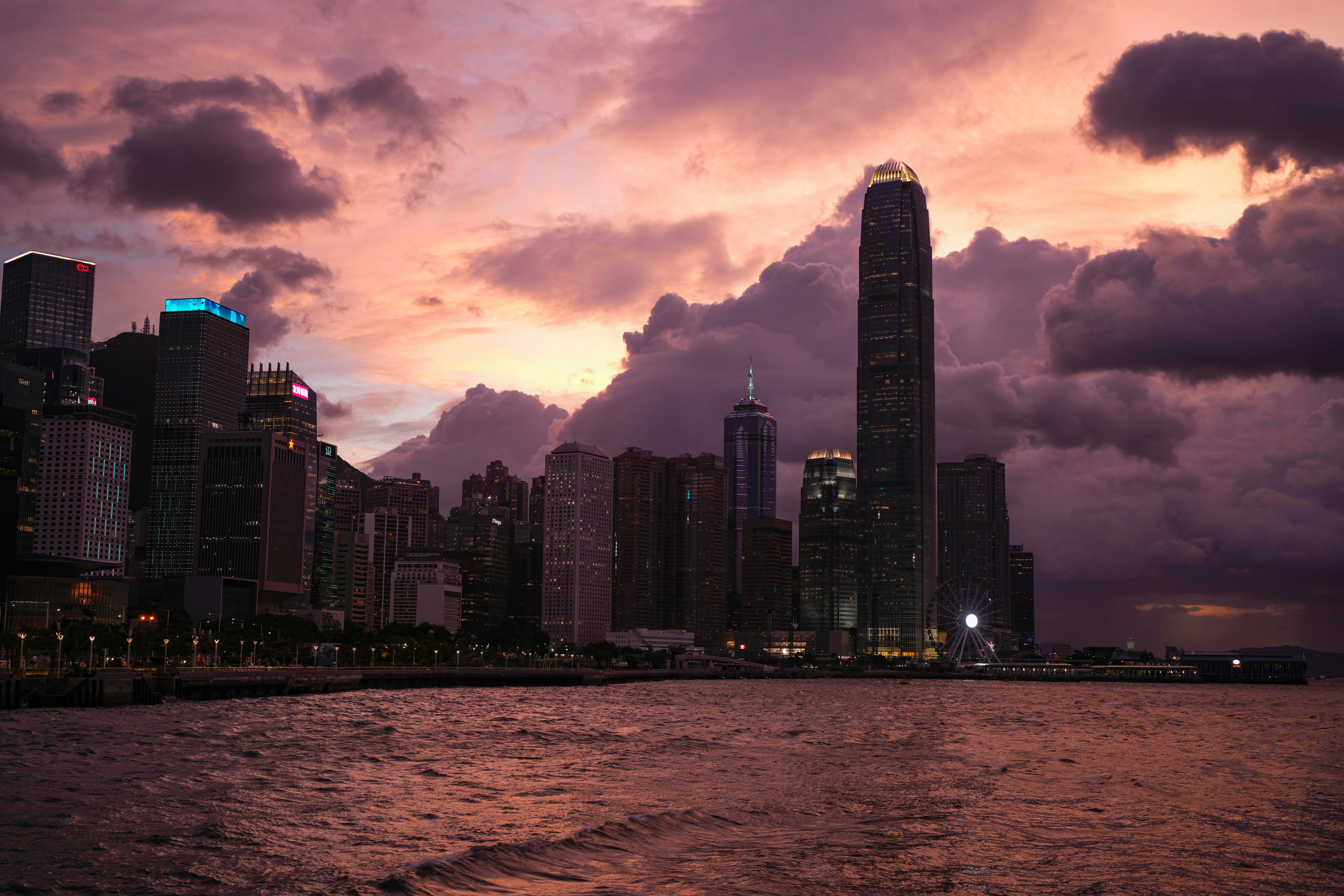 Twilight Harbor: City Silhouette Along a Velvet River