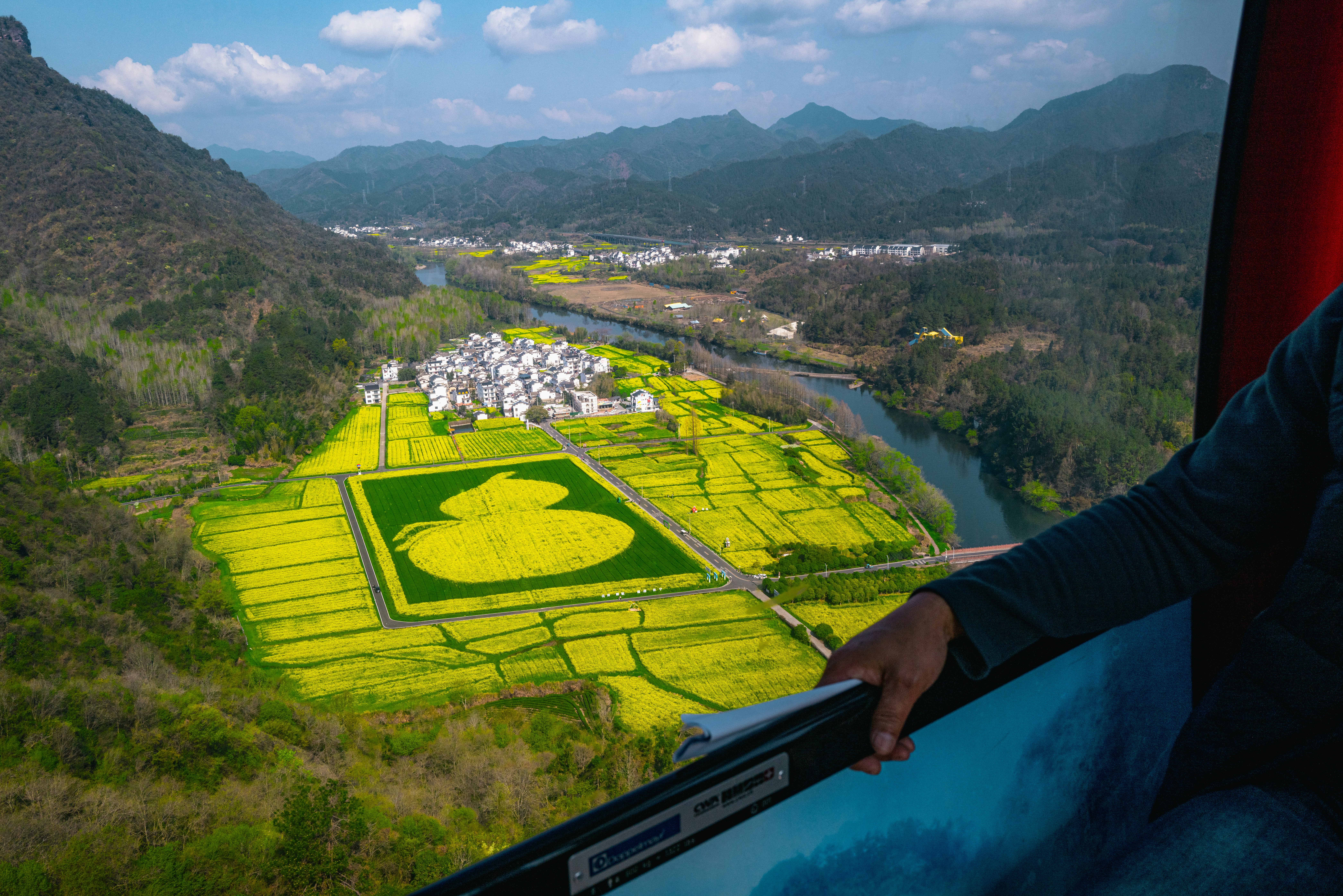 Aerial Terrace: Geometric Fields Framing a Mountain Village