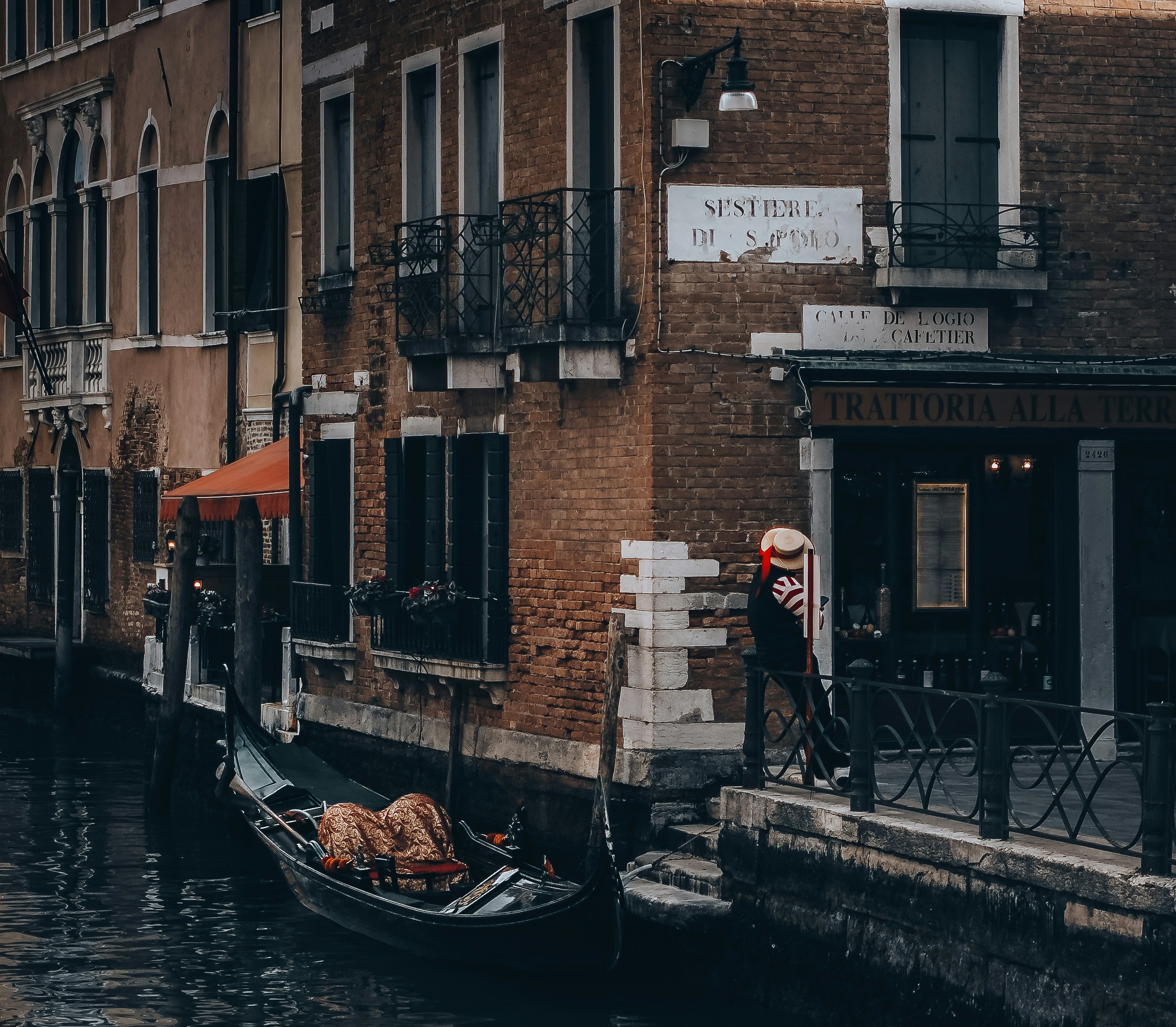 Gondola Quiet by the Canale: A Venetian Street Corner in Dusk