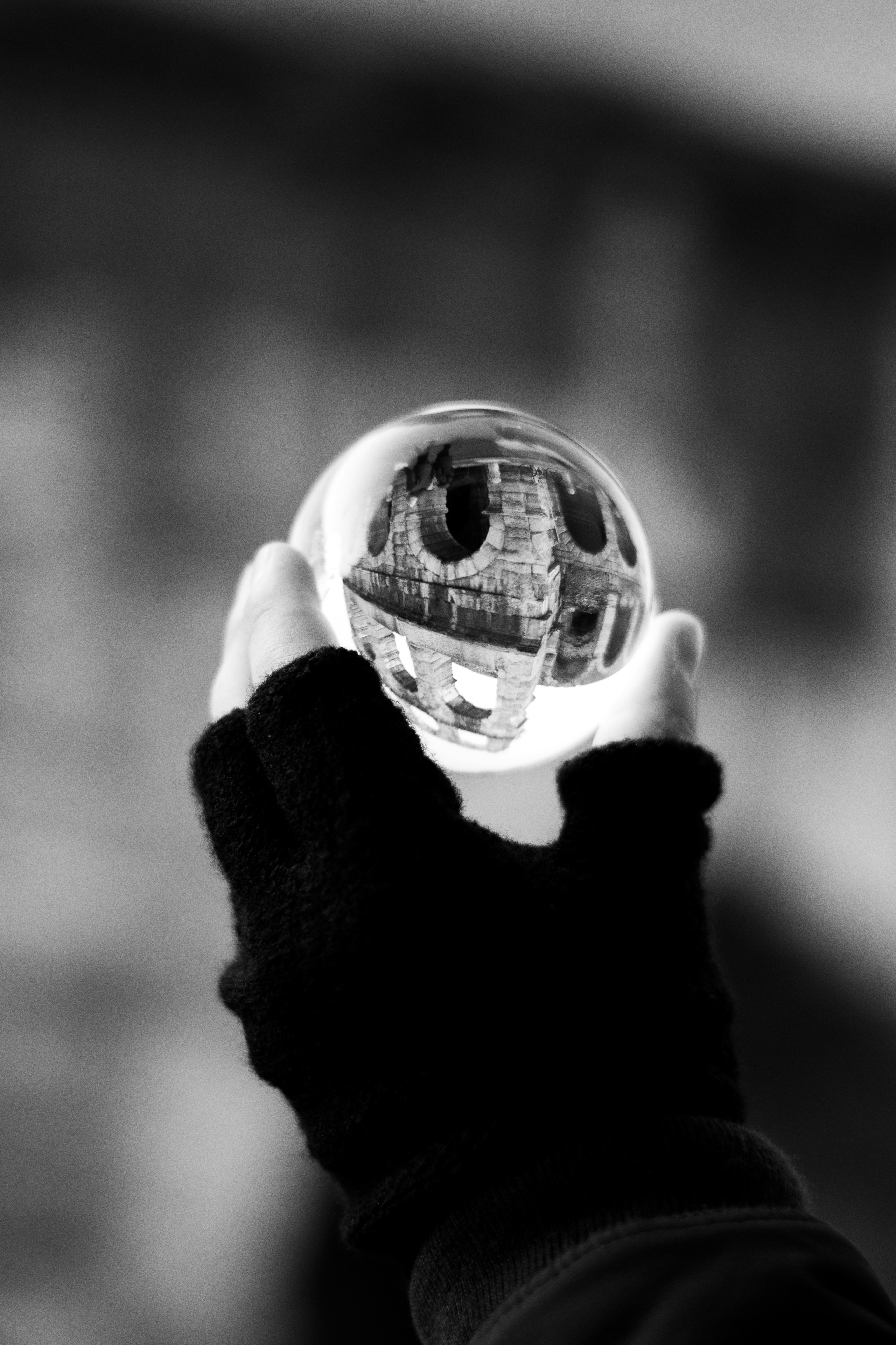 Crystal Globe: Handheld Focus on a Gripped Lens Ball