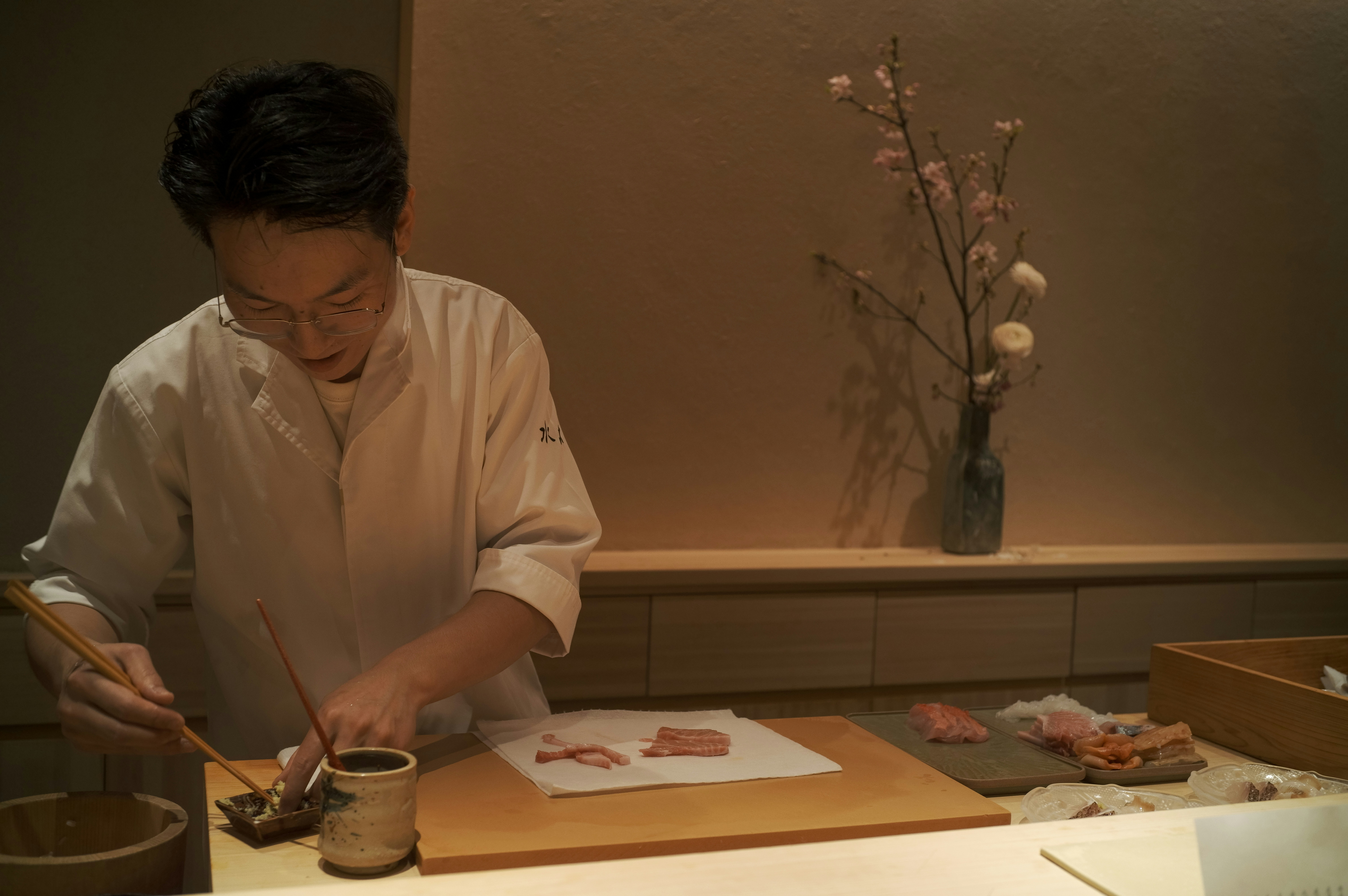 Chef at Work: Delicate Plating in a Quiet Studio Kitchen