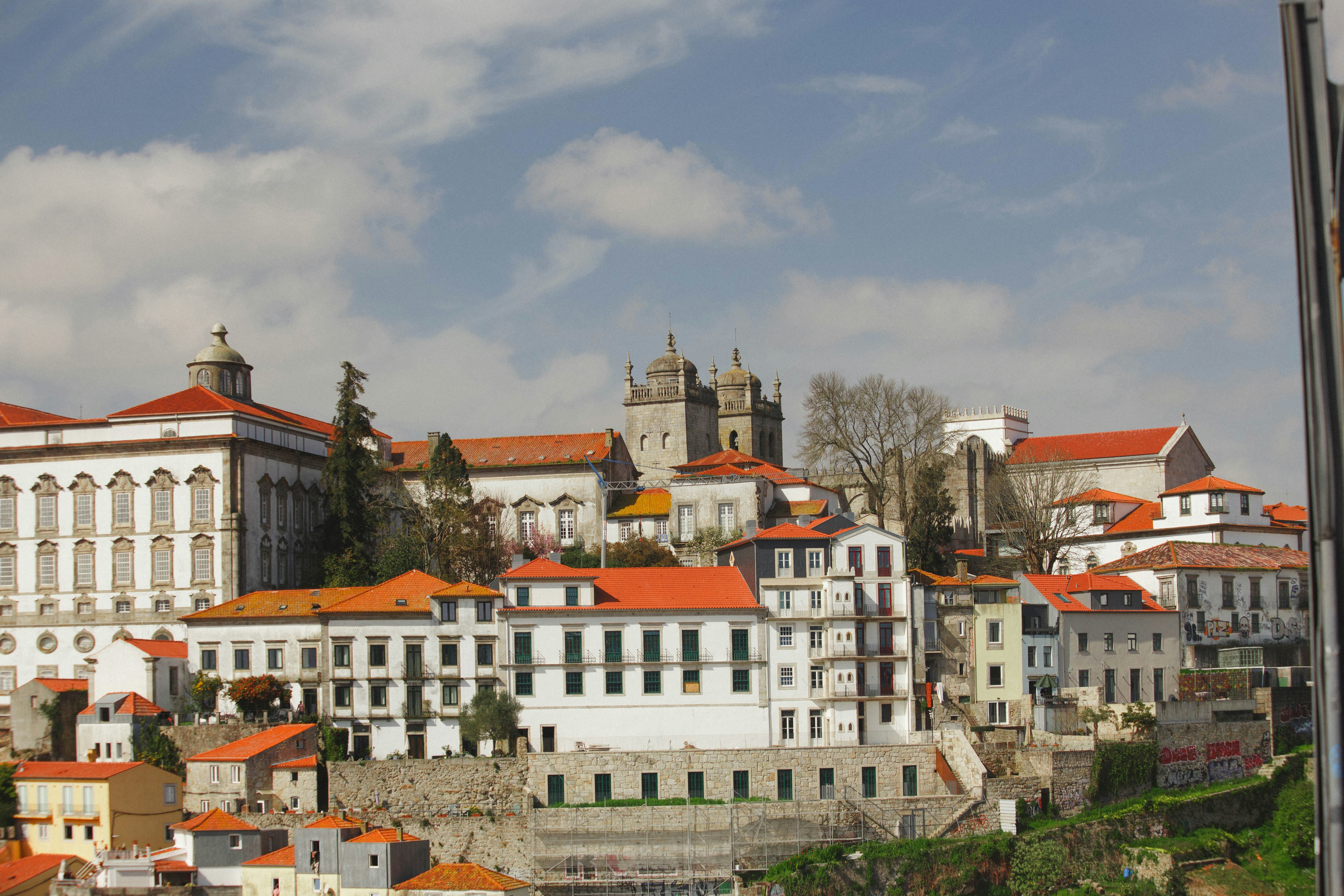 Terraced Calçada: A Red-Tiled Horizon Over a Coastal Portuguese Town