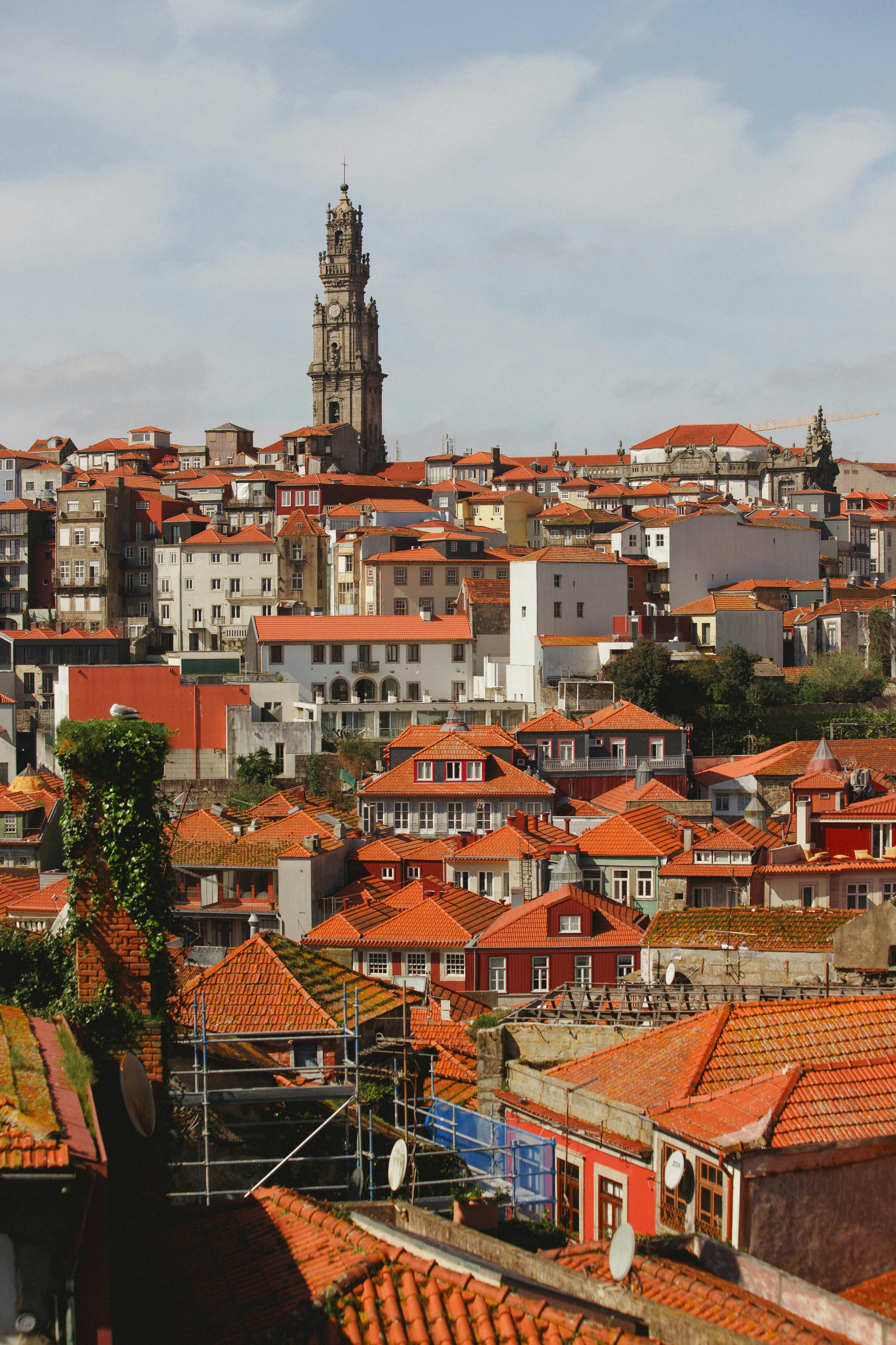 Red-Tiled Cityscape crowned by a Gothic Bell Tower