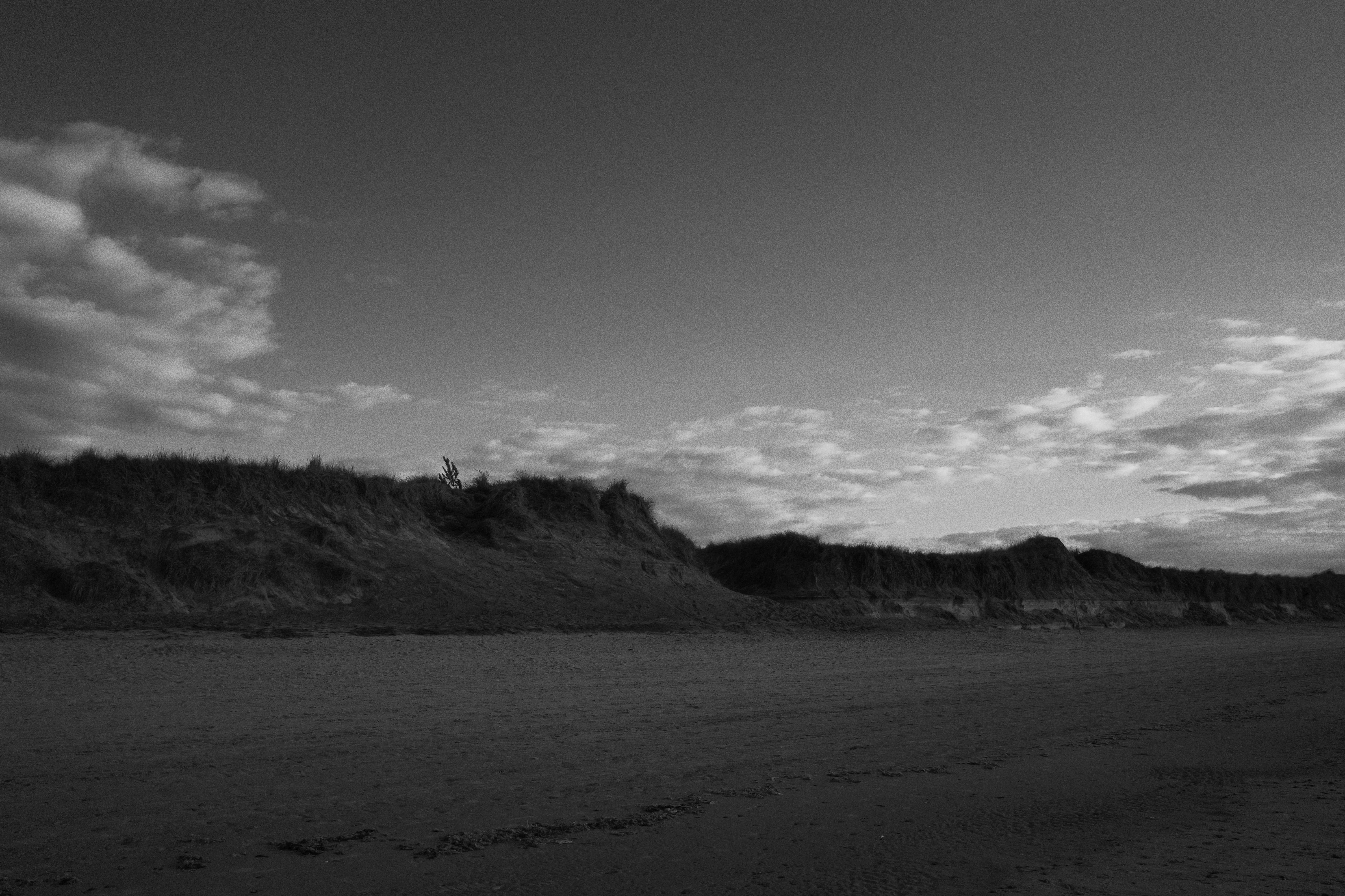 Dune Ridge Under Wide Sky