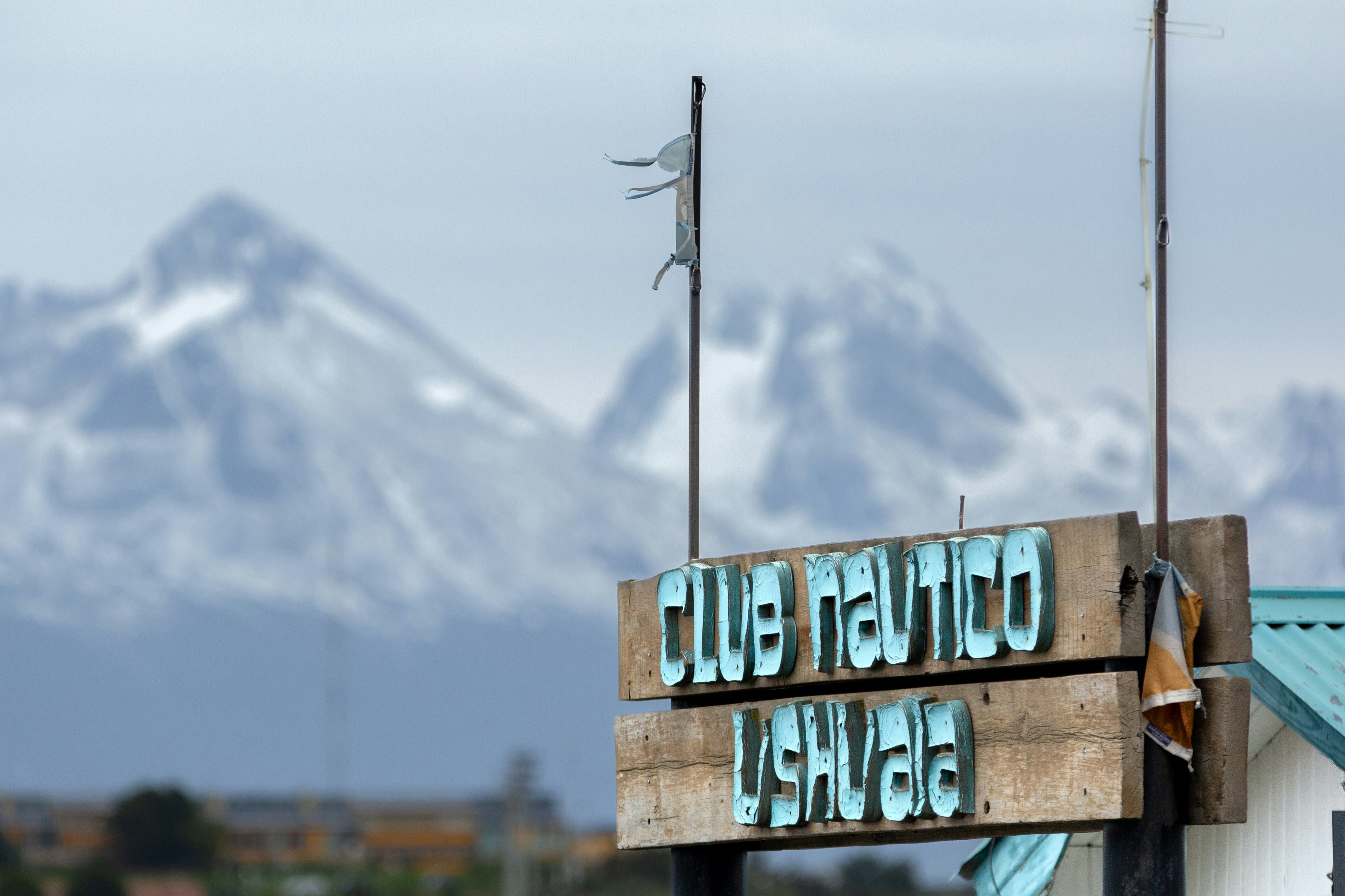 Weathered Shoreline Sign Heralding an Allure of the Unknown