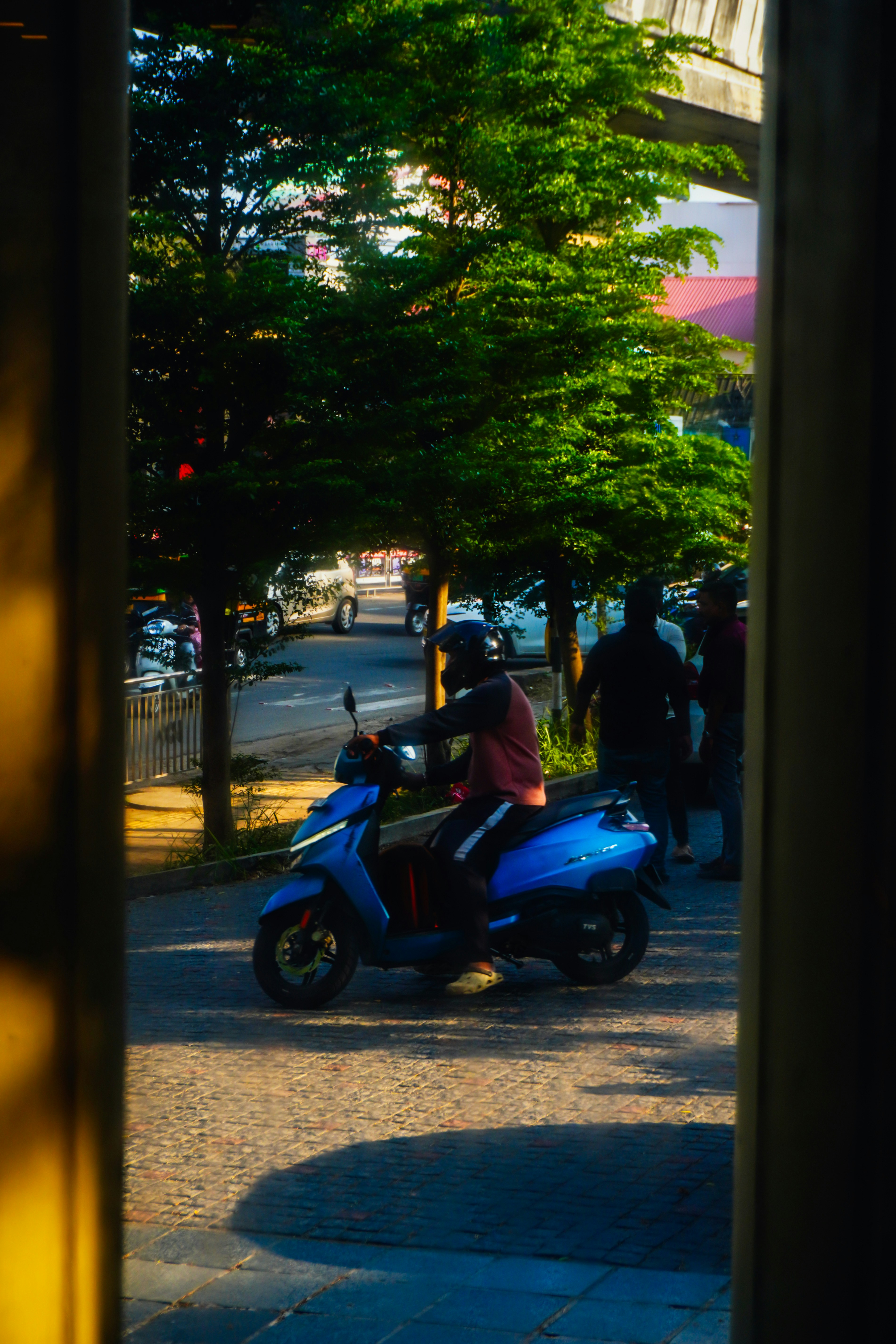 Scooter Stop: A Quiet Moment in a Busy Street