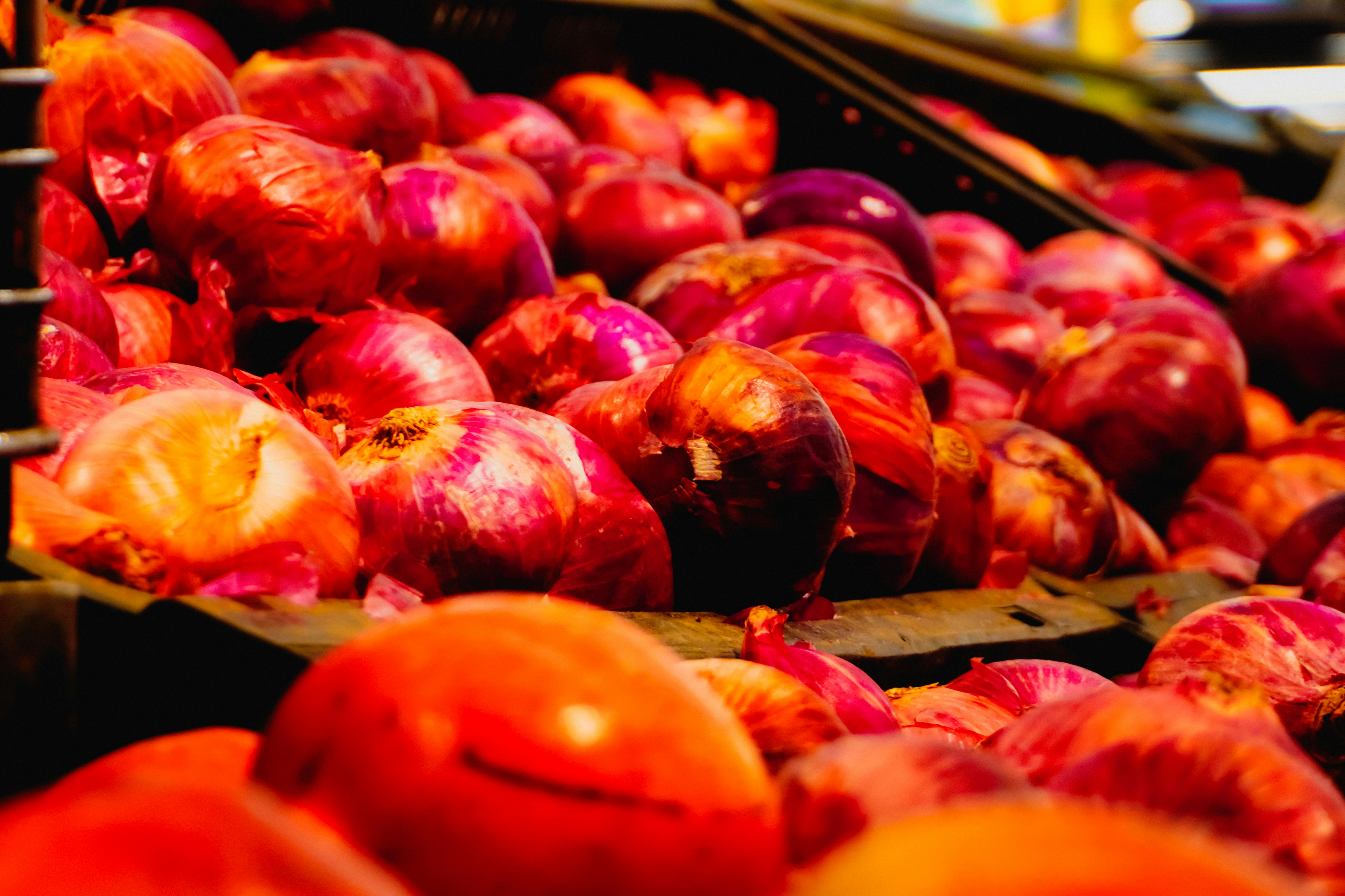 Crimson Bounty: A Cluster of Glowing Red Onions}