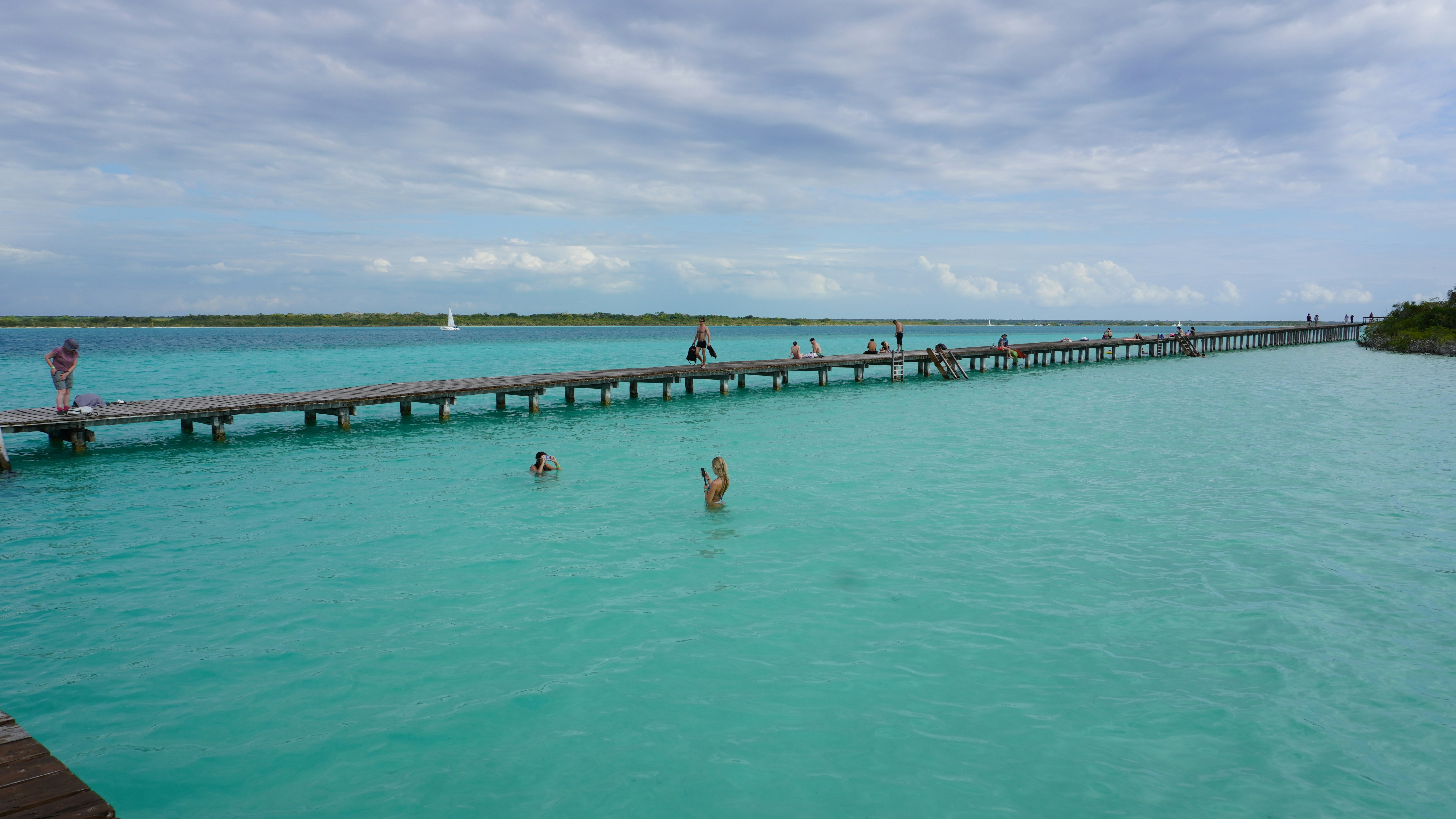 Turquoise Horizon: A Long Pier Piercing the Caribbean Sea