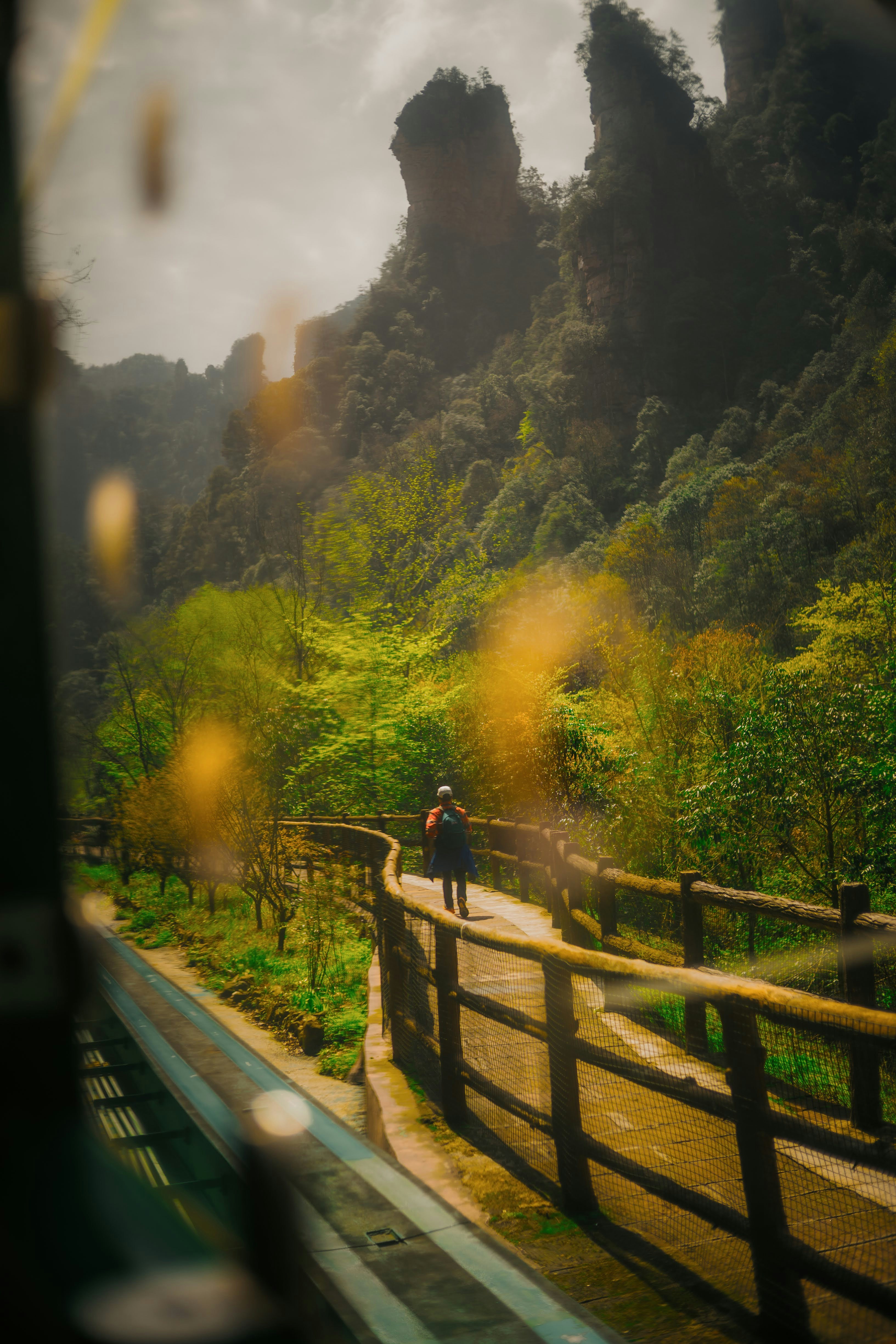 Trail Wanderer Amid Jagged Peaks