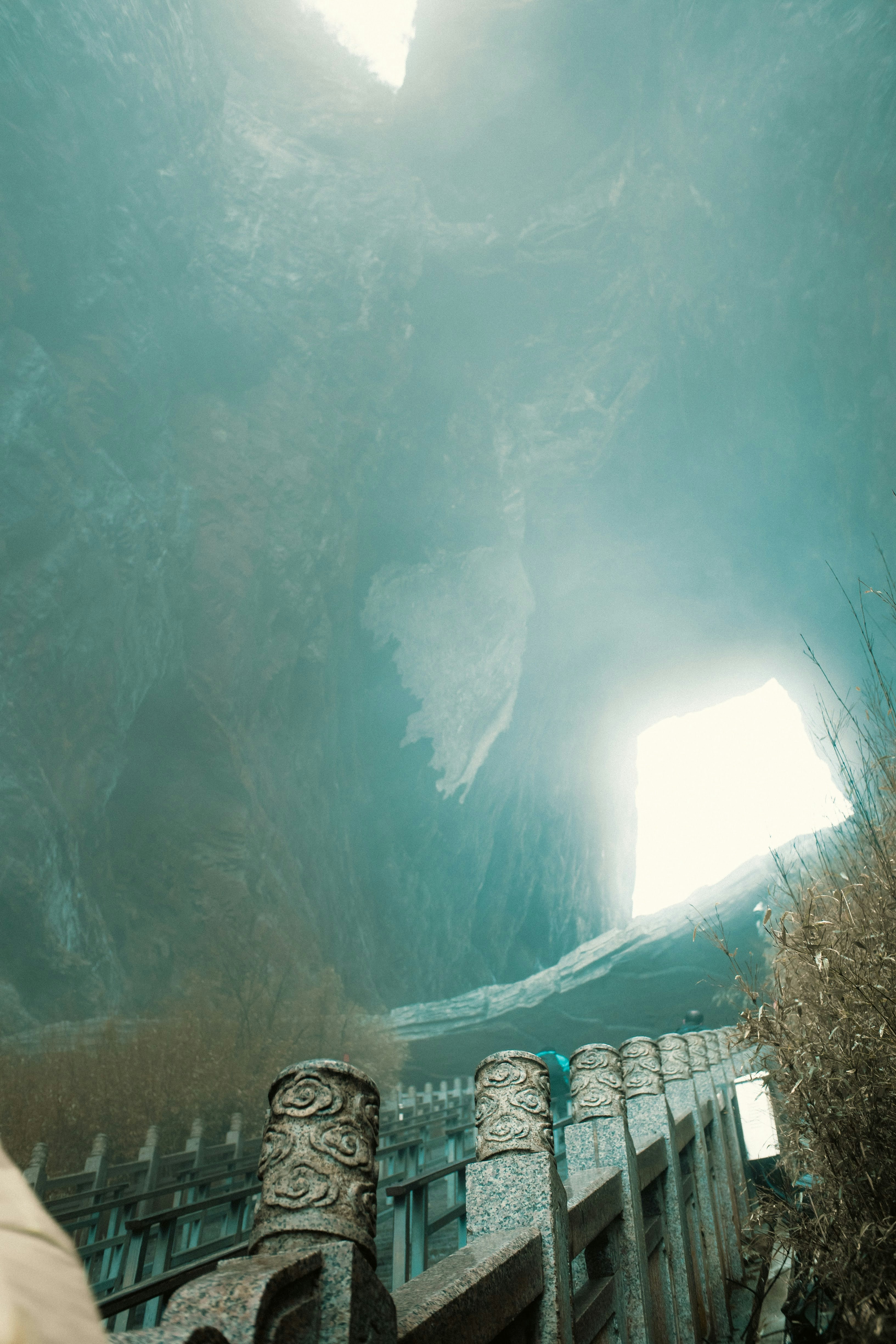 Azure Cathedral: Light Breach Through Ice Canyon
