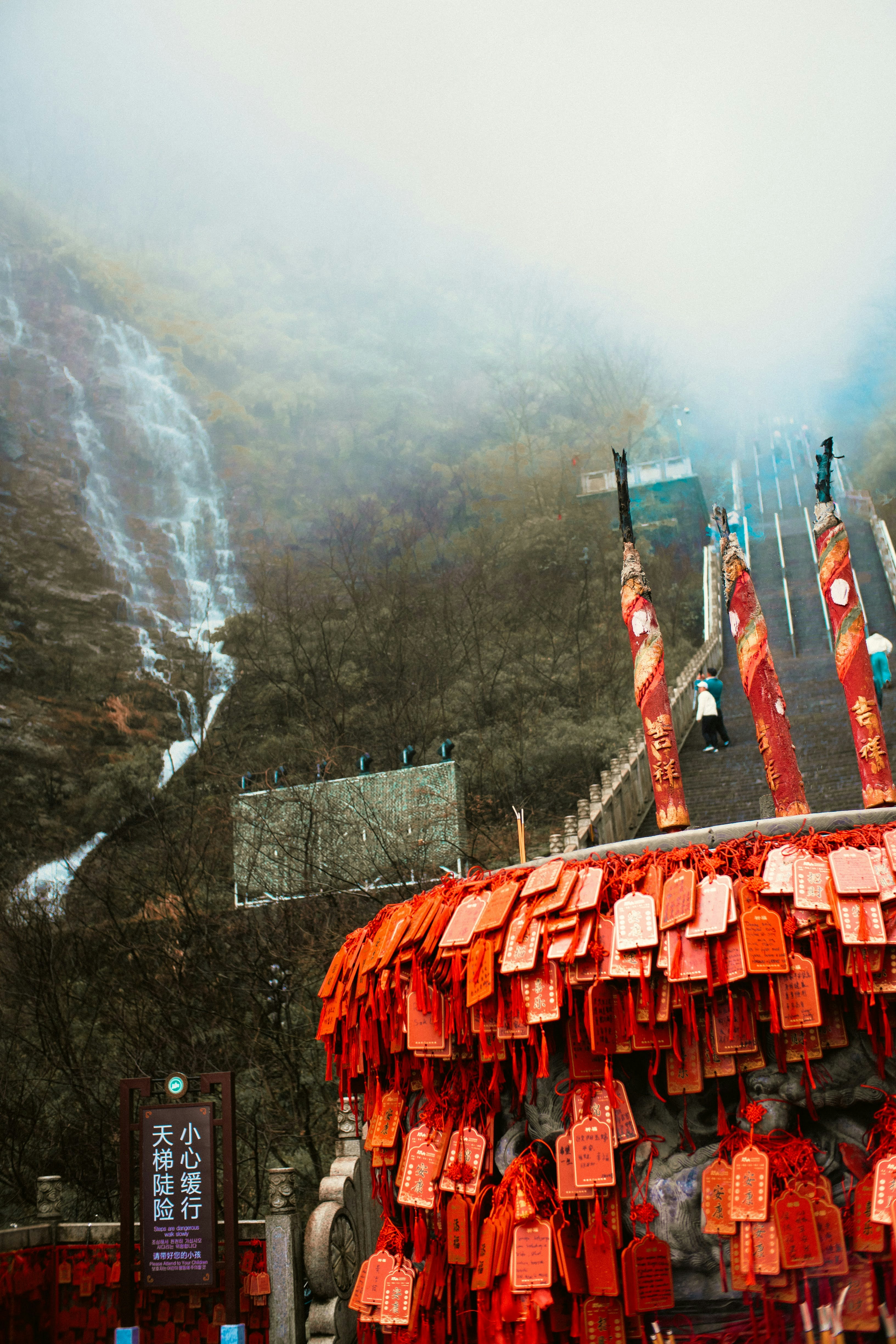 Red Lanterns and Sacred Messages at Mountain Shrine