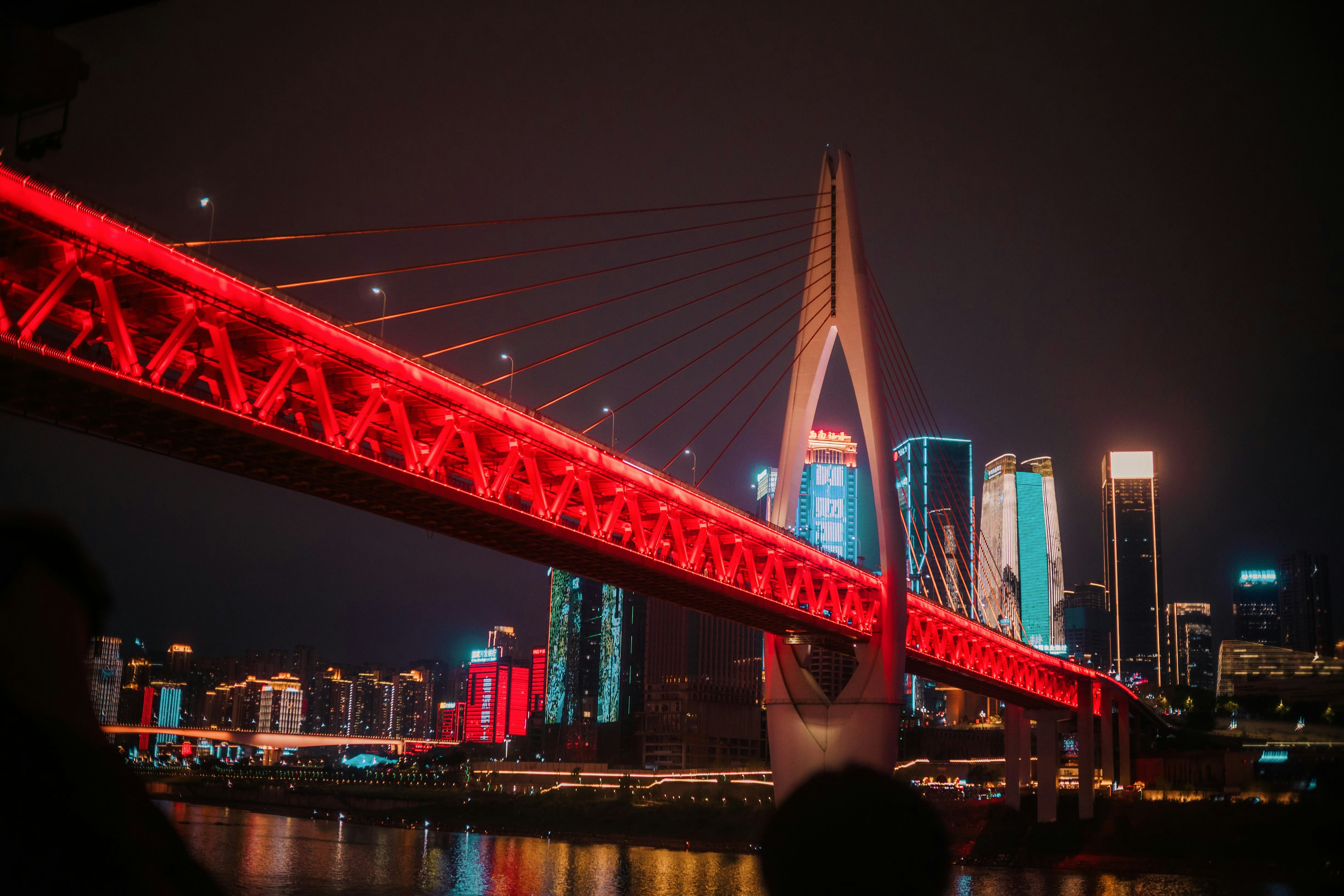 Neon Arc: Night Roads Over Shanghai’s Red Bridge