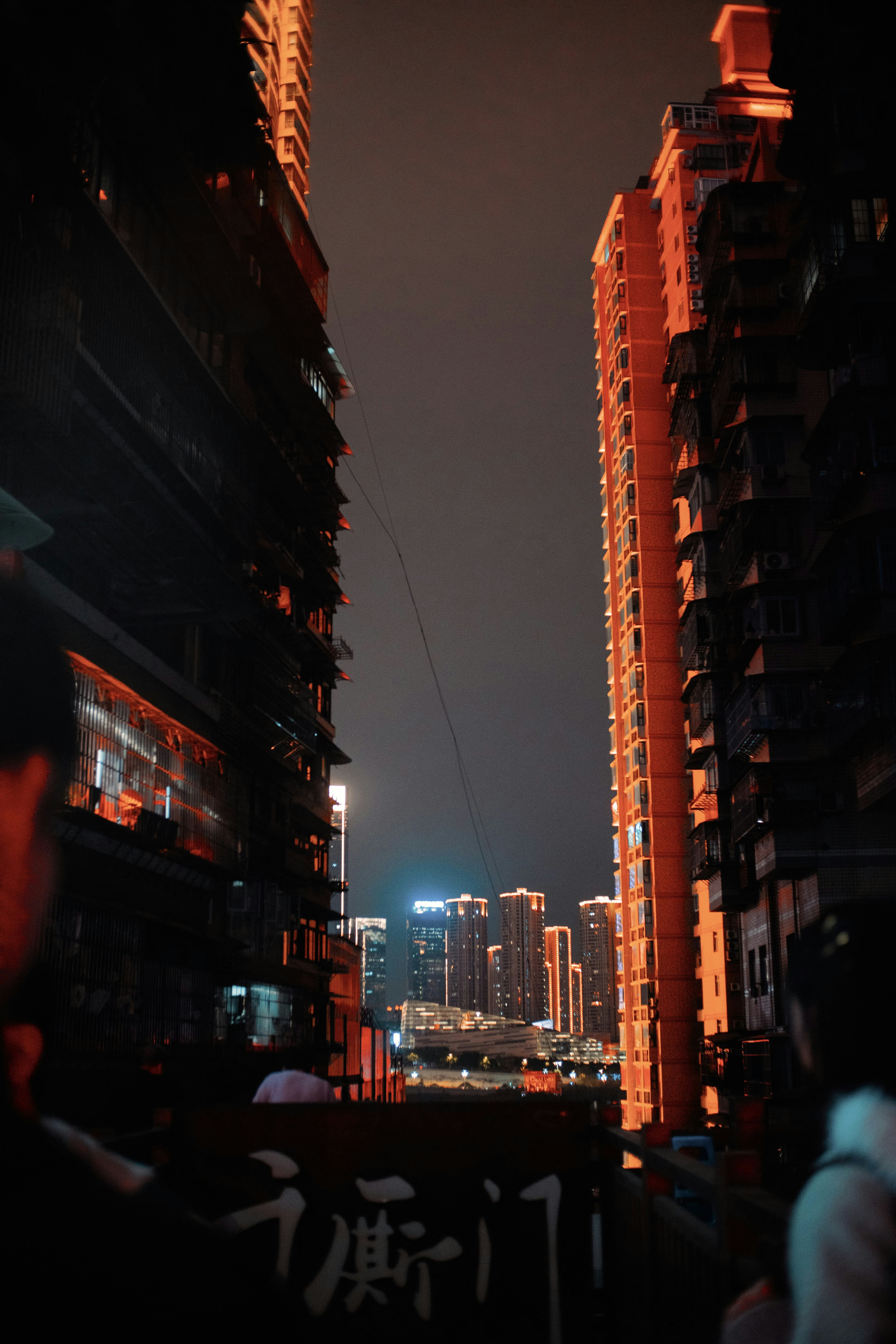 Neon Gateways: City Canyon from a Midnight Overlook