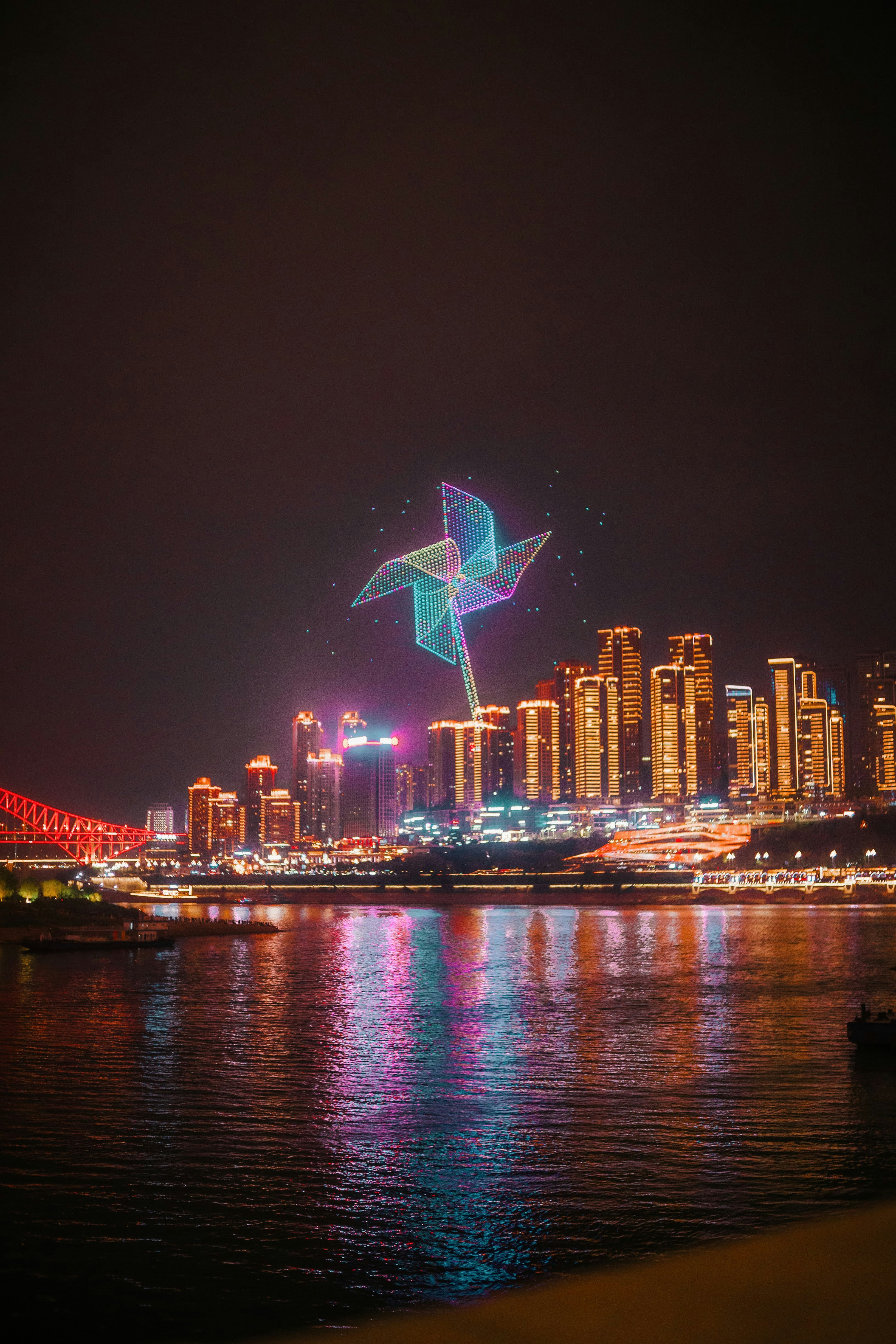 Neon Crane Over the Riverside Skyline