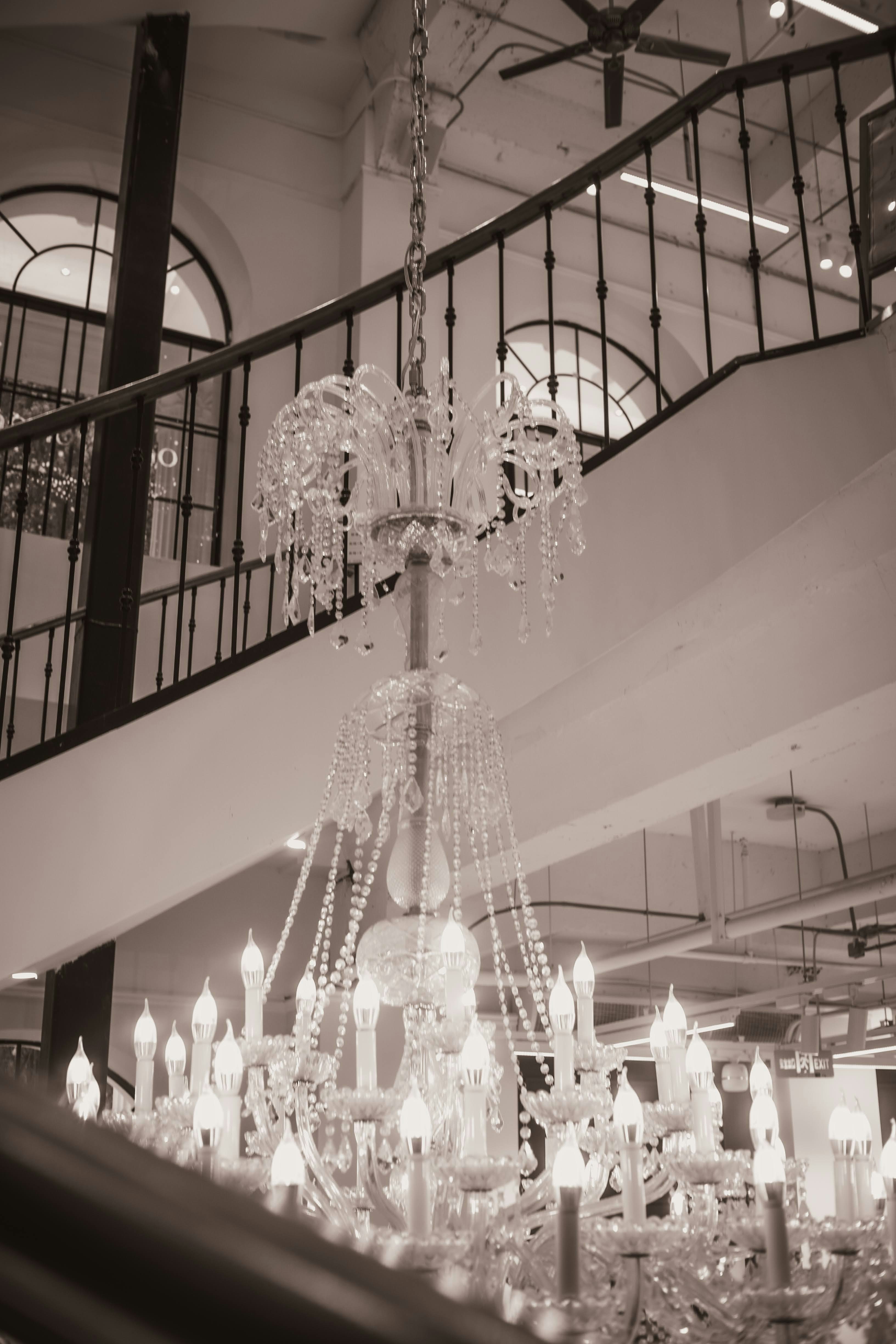 Crystal chandelier suspended in an industrial loft