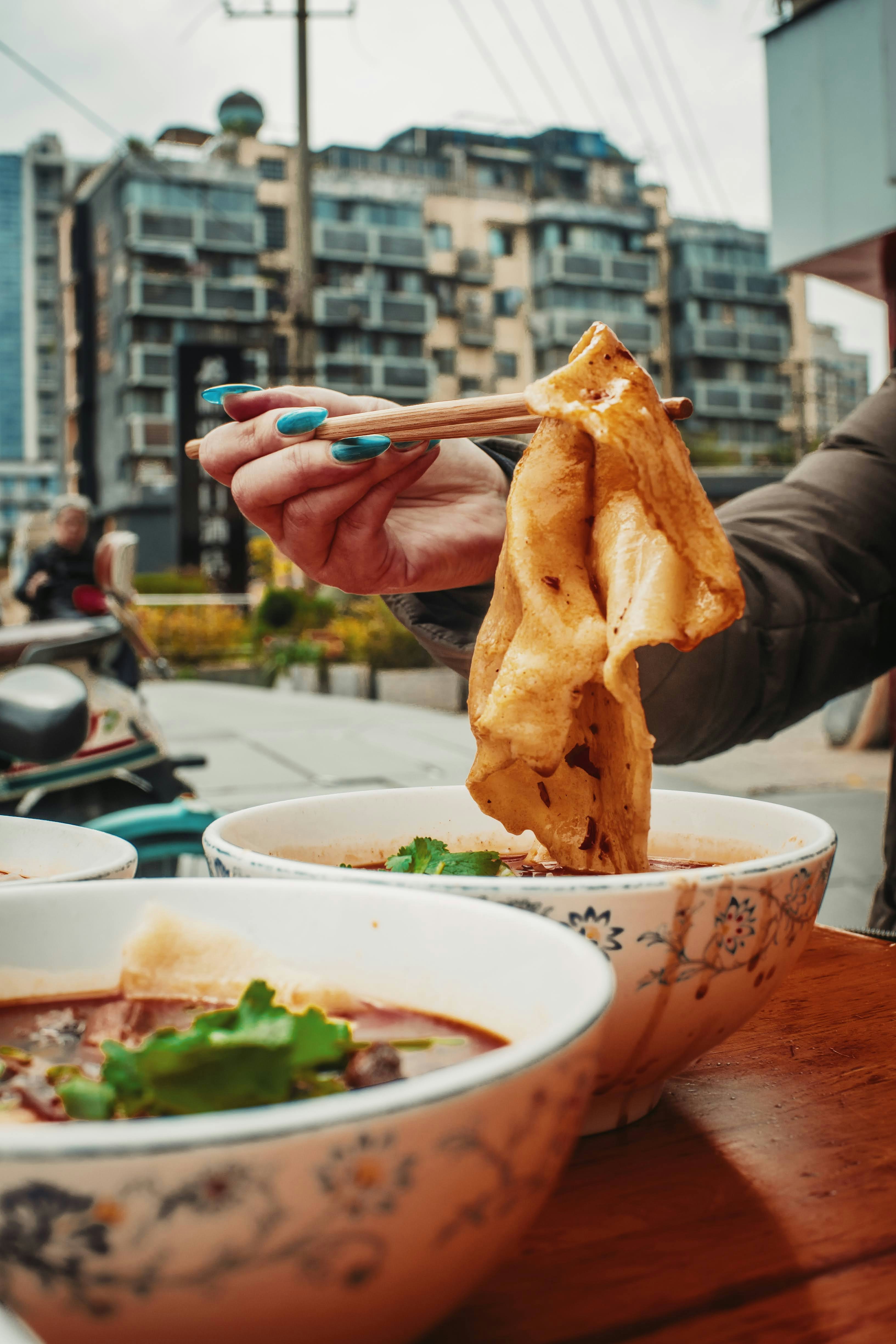 Chopstick Doodad: A Noodle Tug of War Over a Bowl of Steam