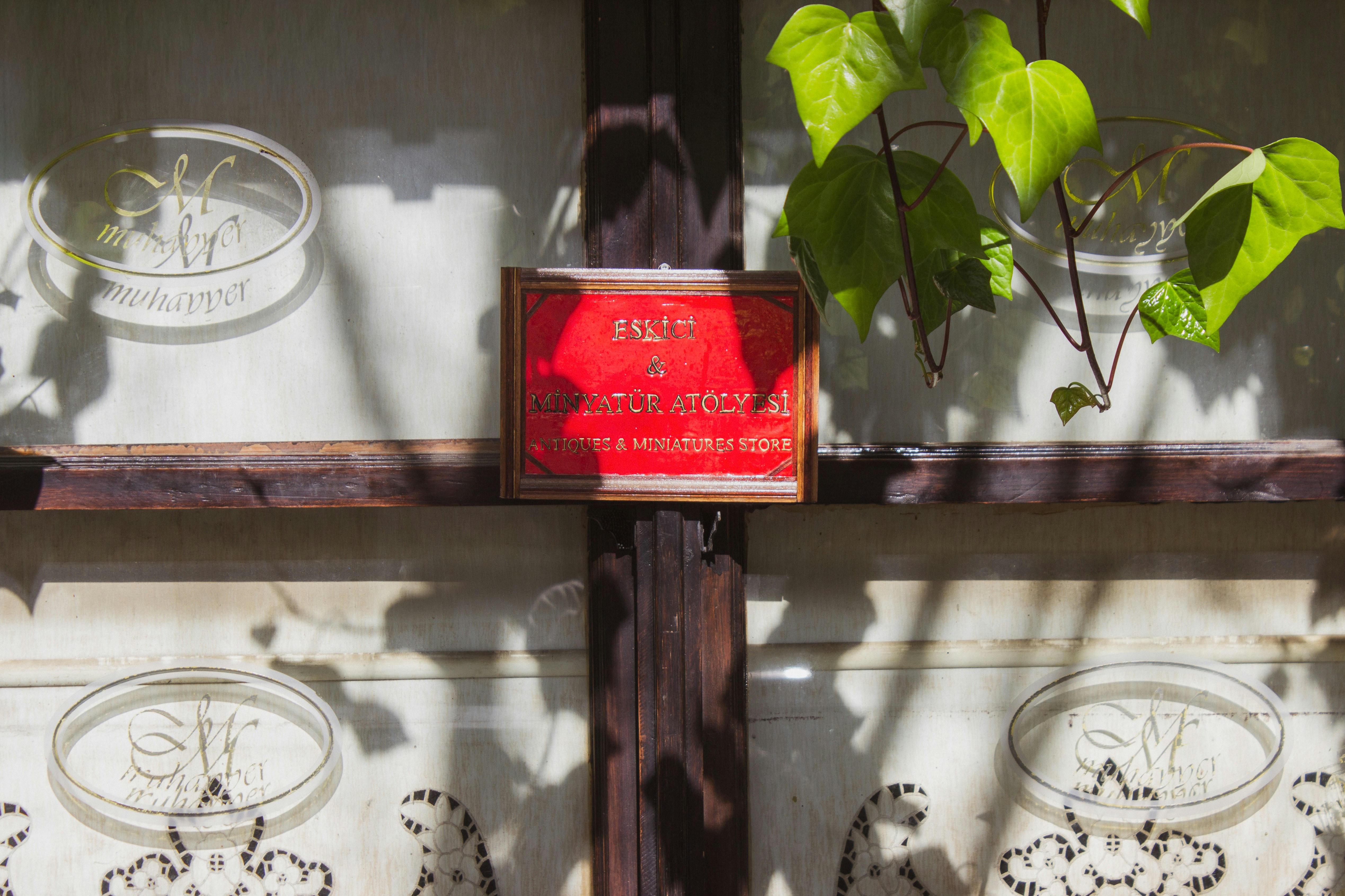 Red Center Sign Anchoring a Sunlit Doorway