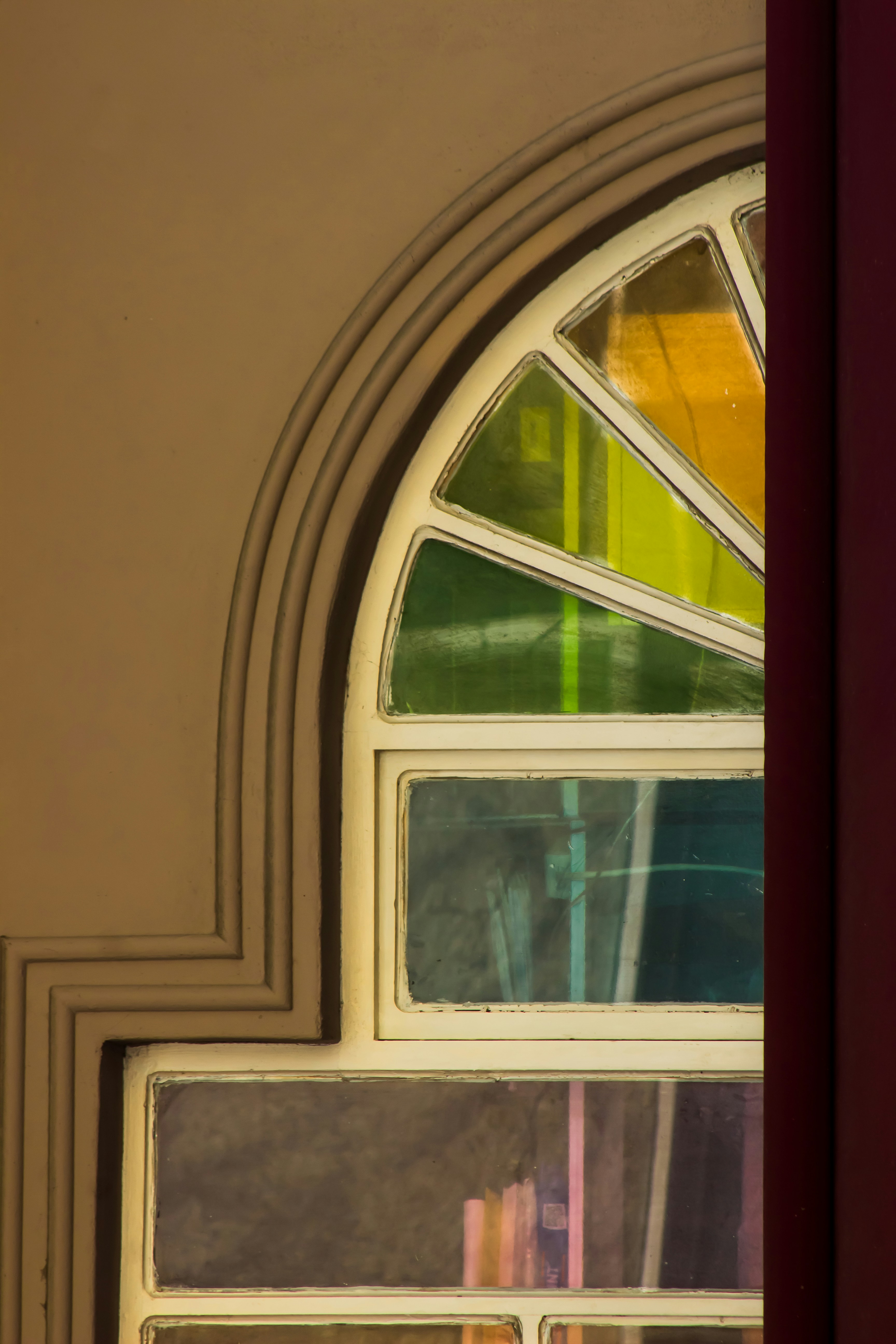 Colored Light Through an Archway Window