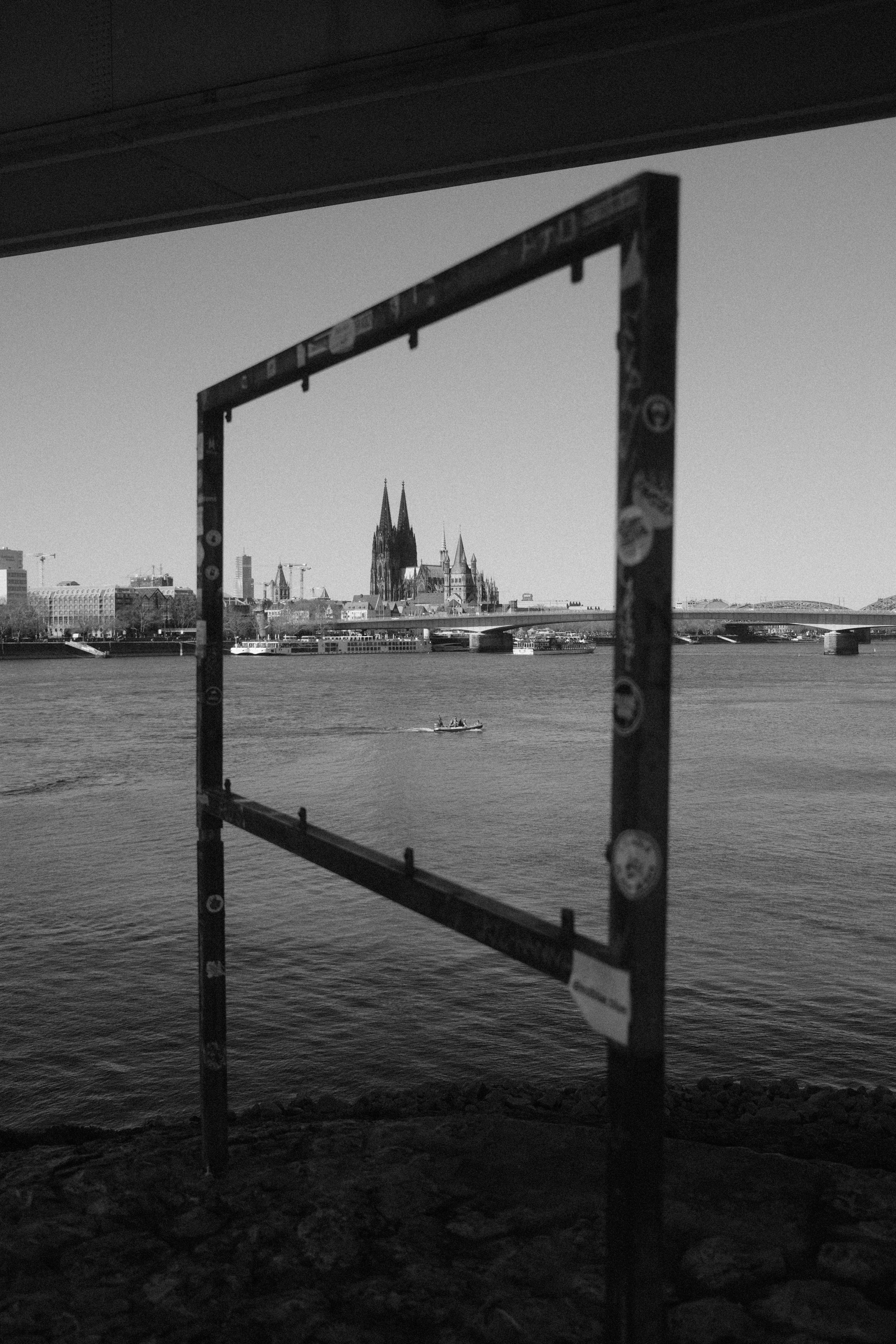 City Frame: River Vignette through a Graffiti Portal