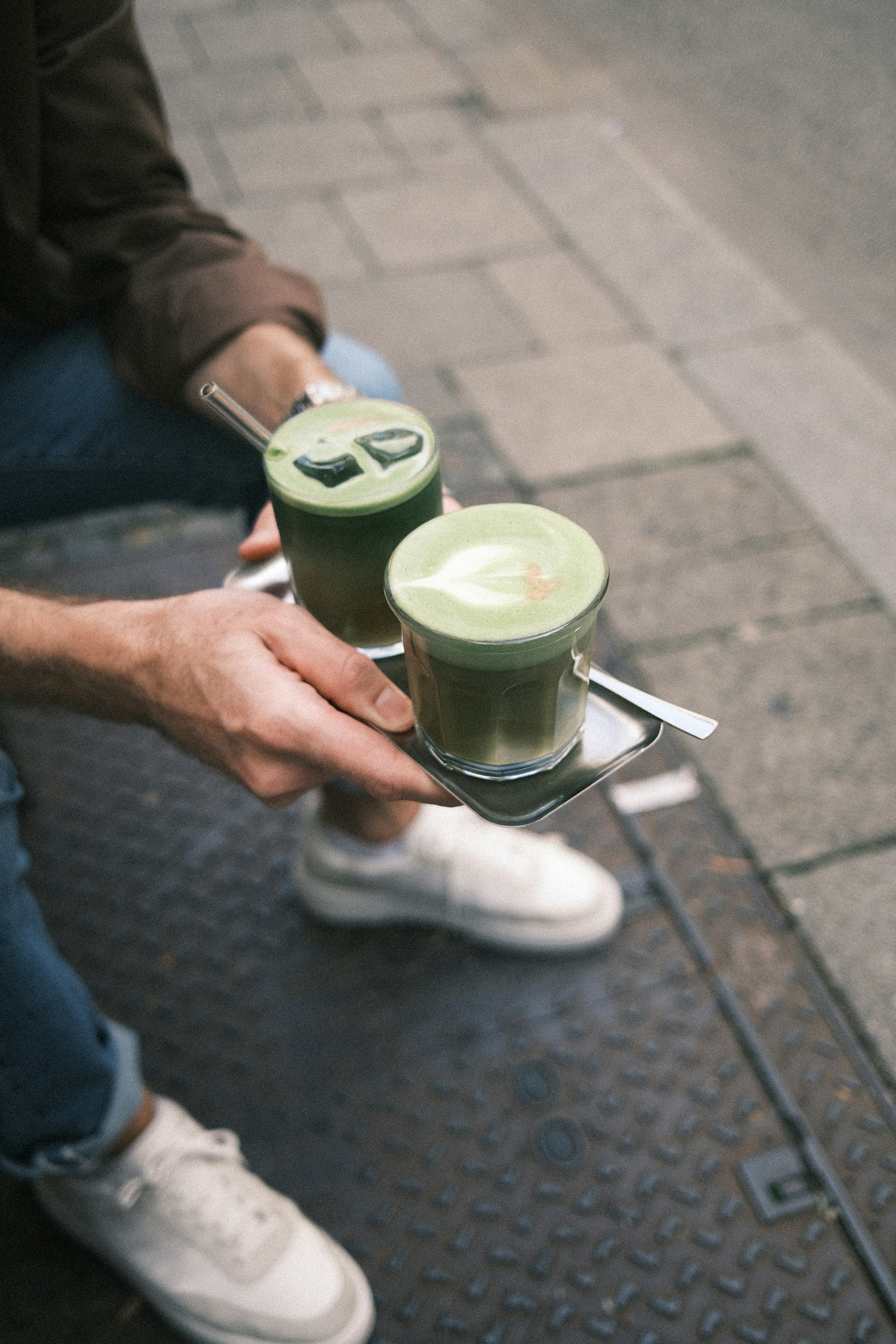 Matcha Mist: Green Tea Cremas on a Street-side Tray