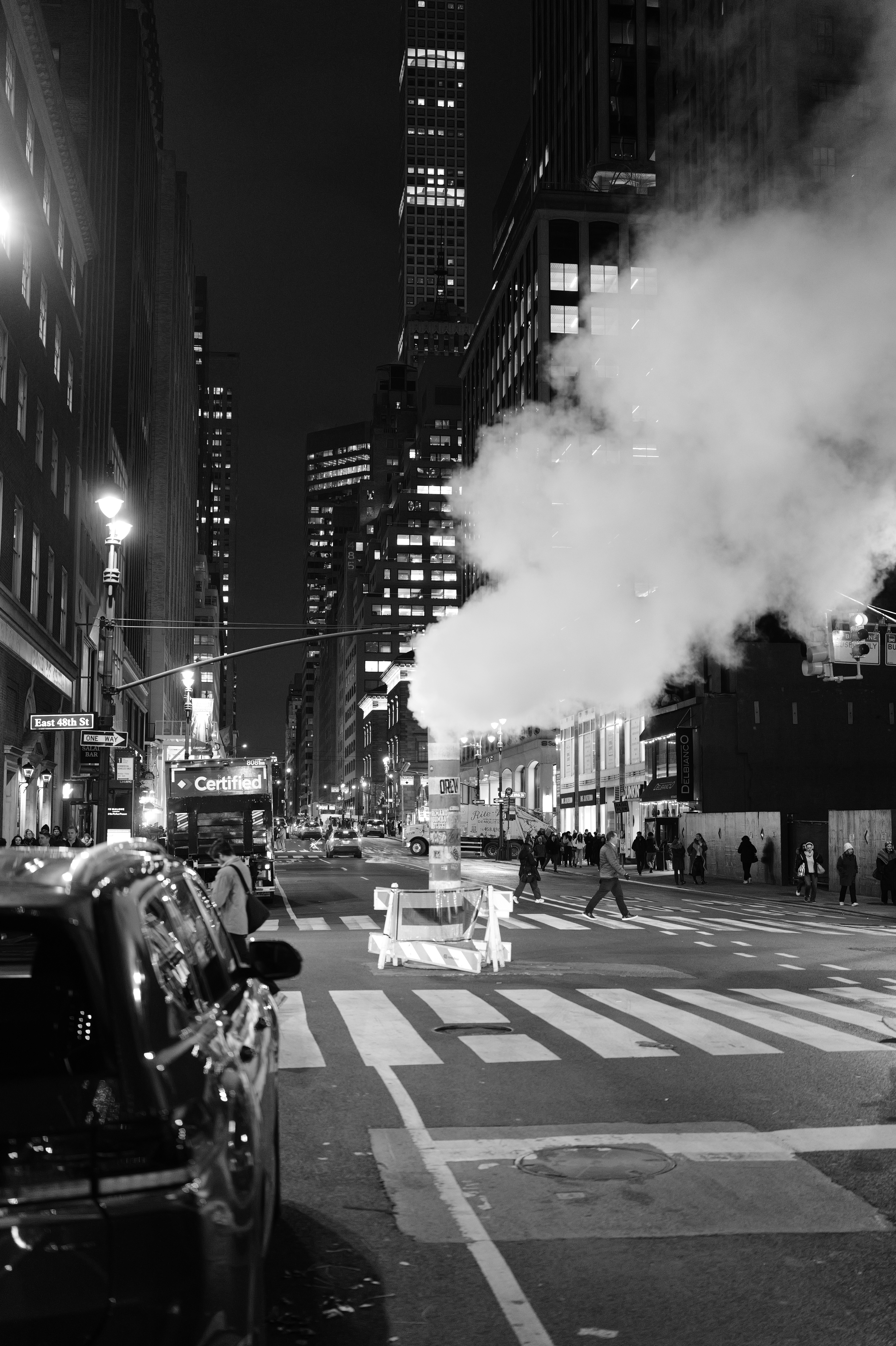 Steam Over Downtown: Night Street in Black and White