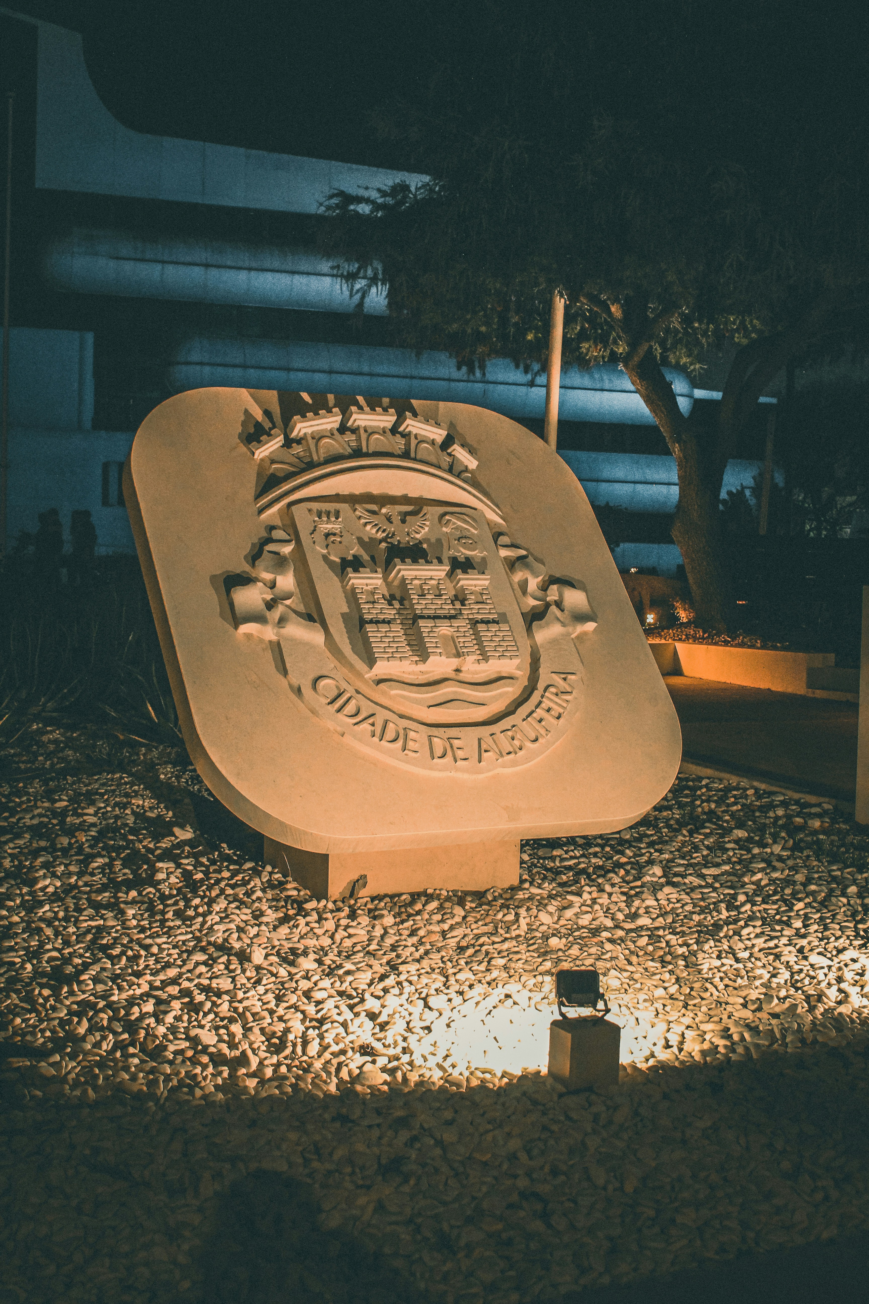 Monumental Emblem Under Night Lights