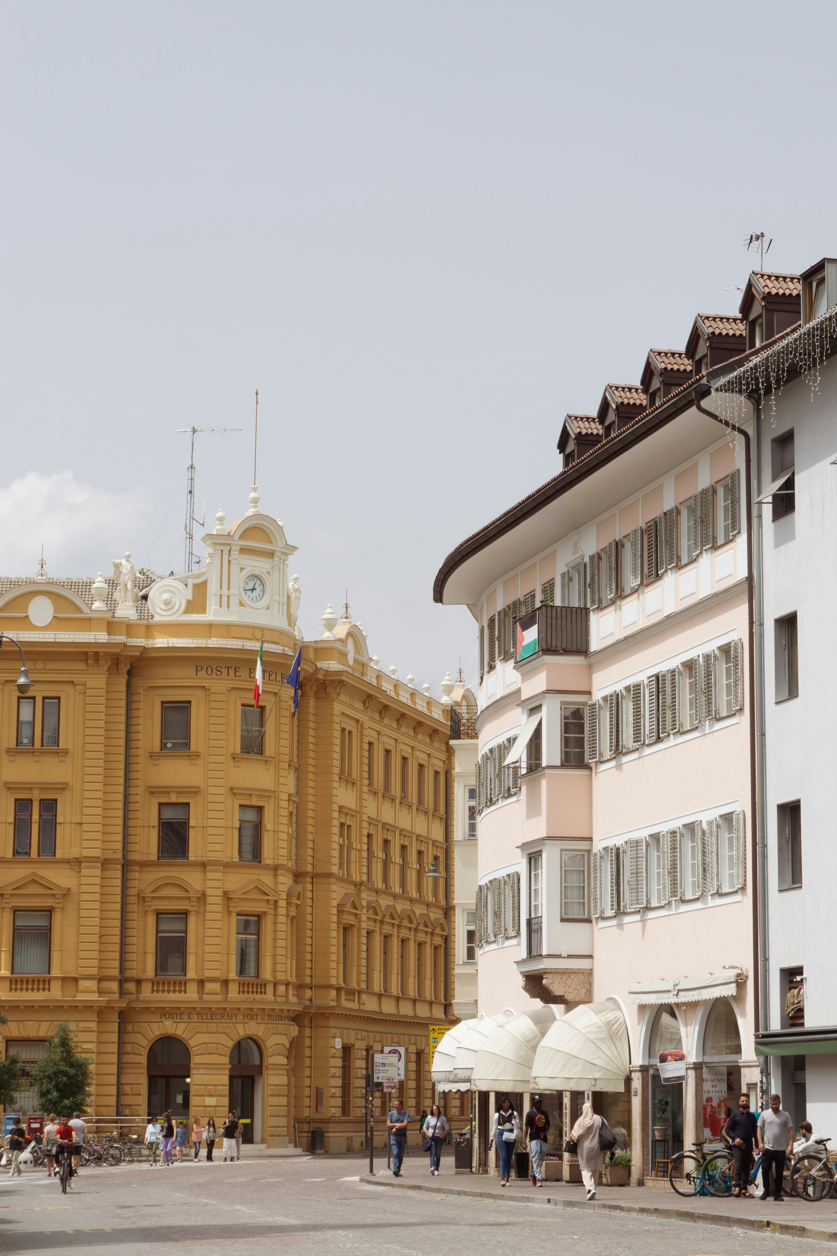 Sunlit European Street: A Tale of Architecture and People