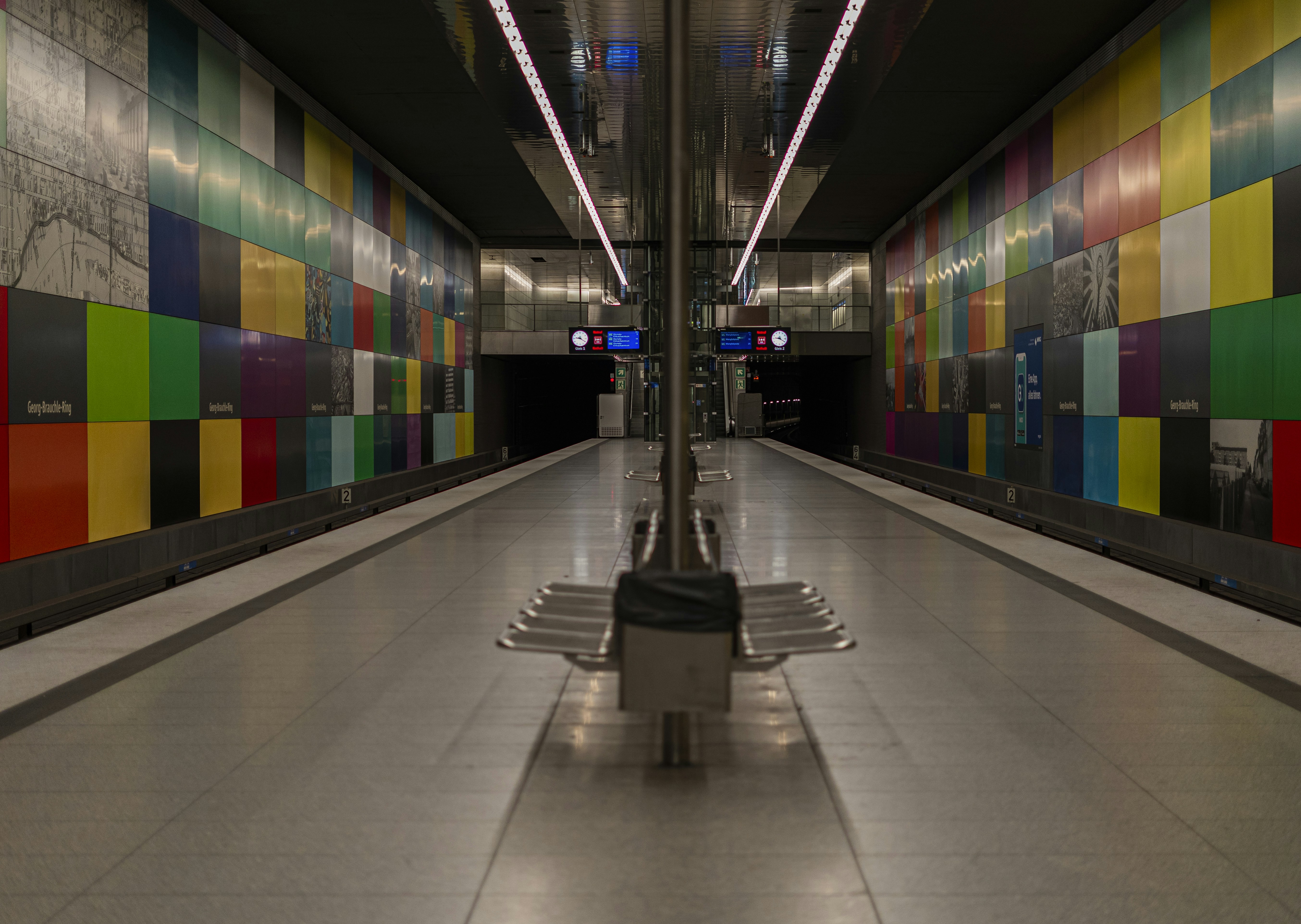 Symmetrical Subterranean Corridor: Color Blocks and Vanishing Rails