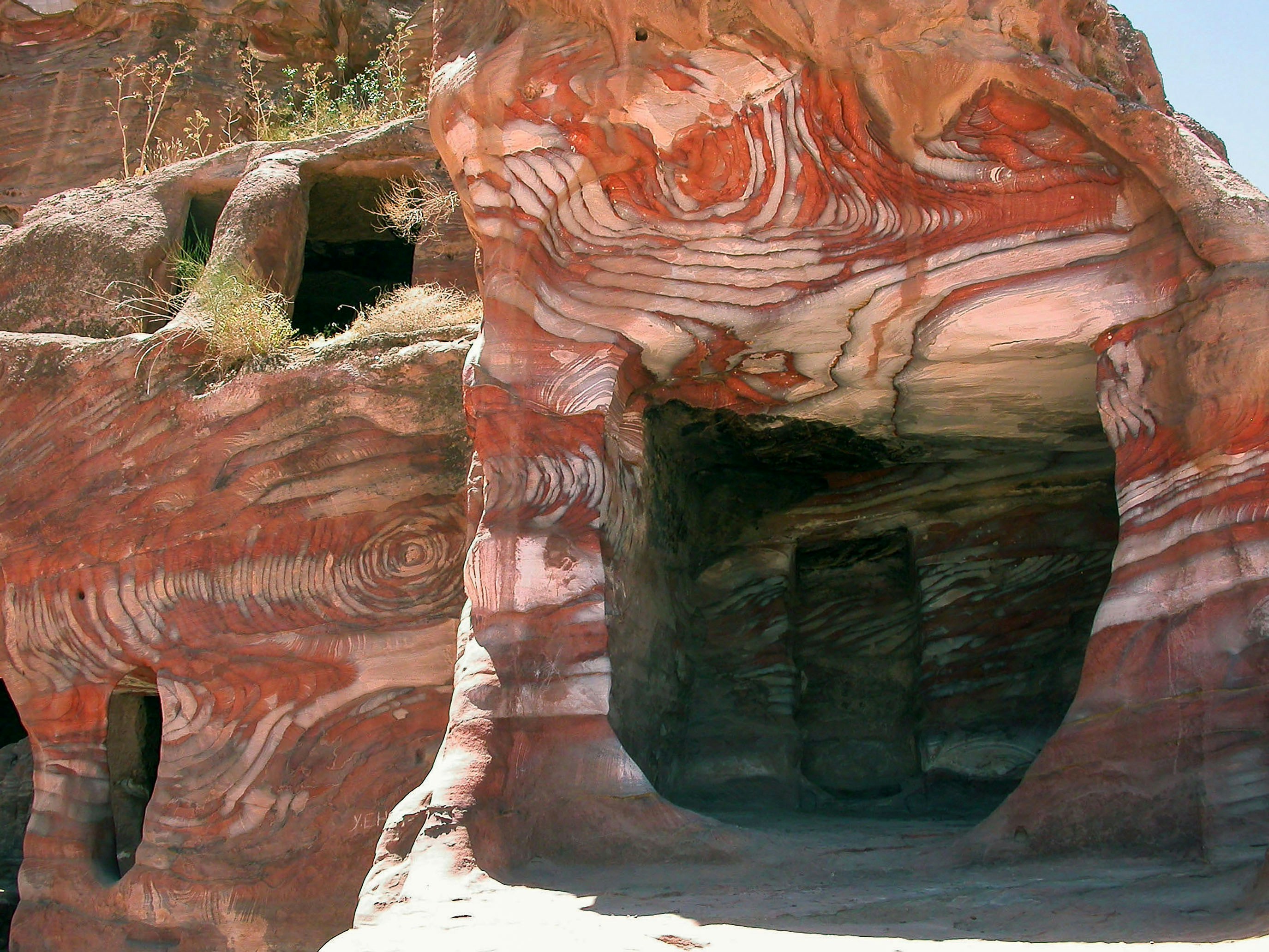 Wrapped in Stone: A Red Rock Cave with Layered Echoes