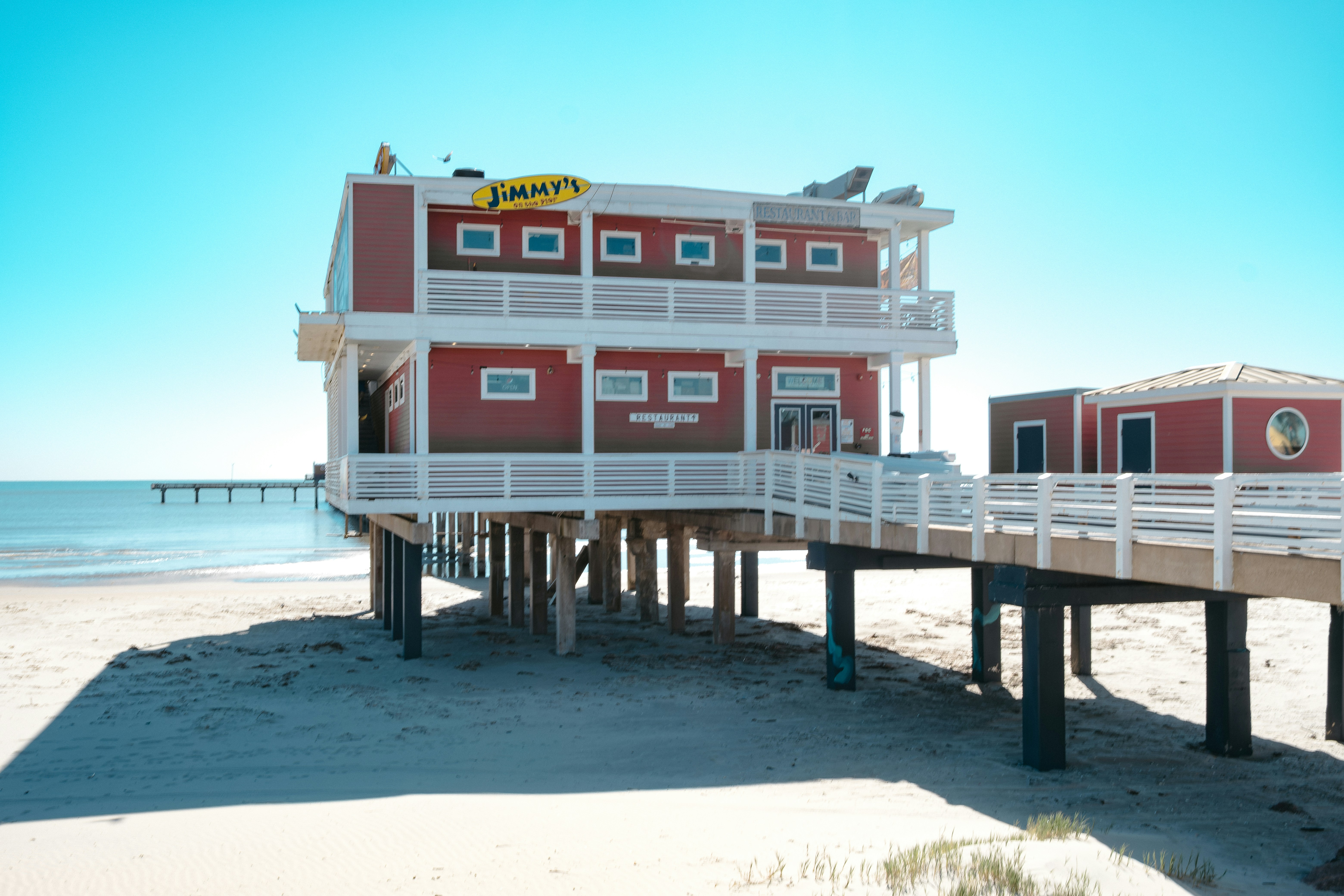Sunny Beachside Lifeguard House on Stilts Over Dreamy Sand