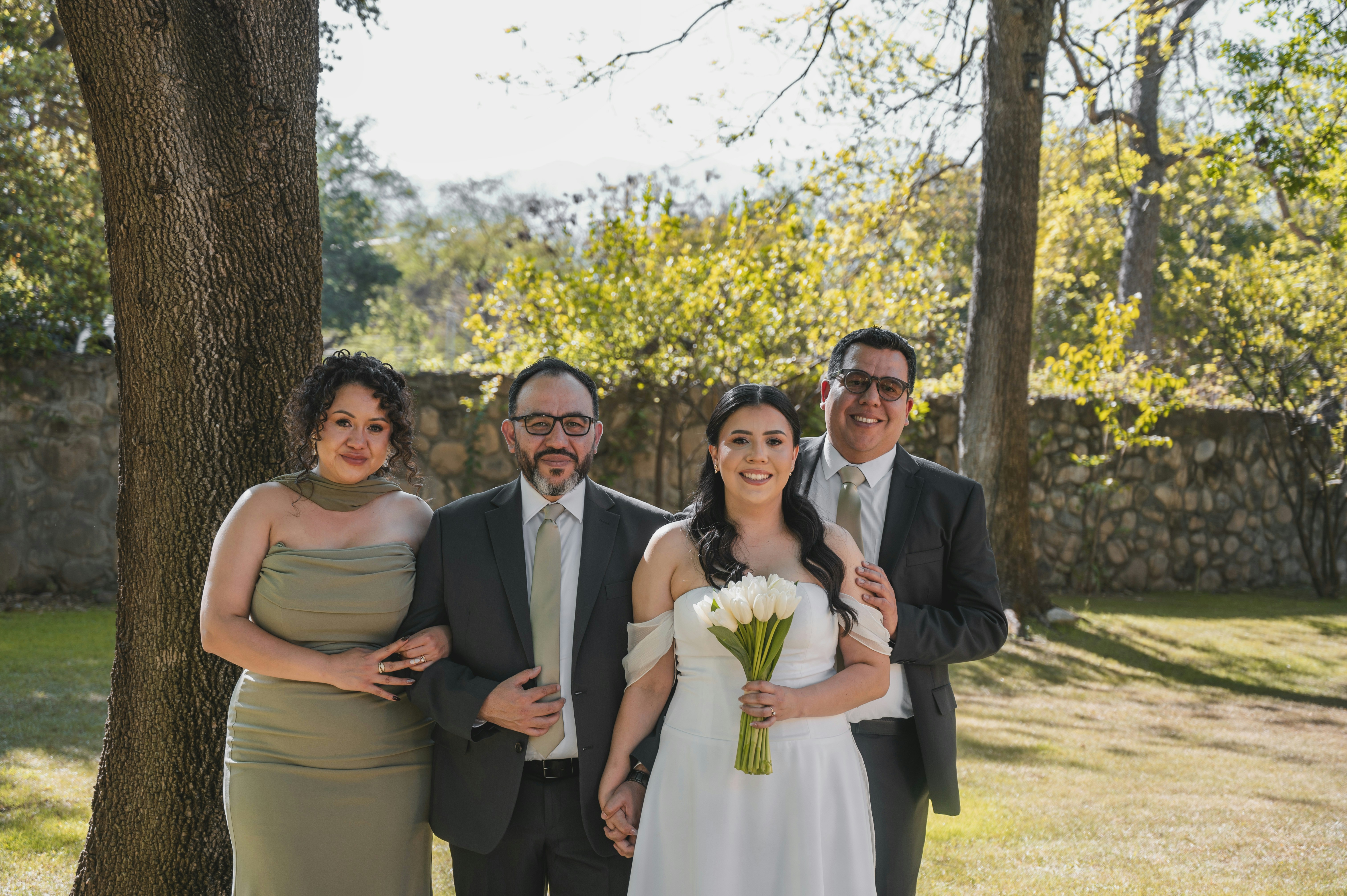 Bridal Glow Under a Canopy of Green and Stone
