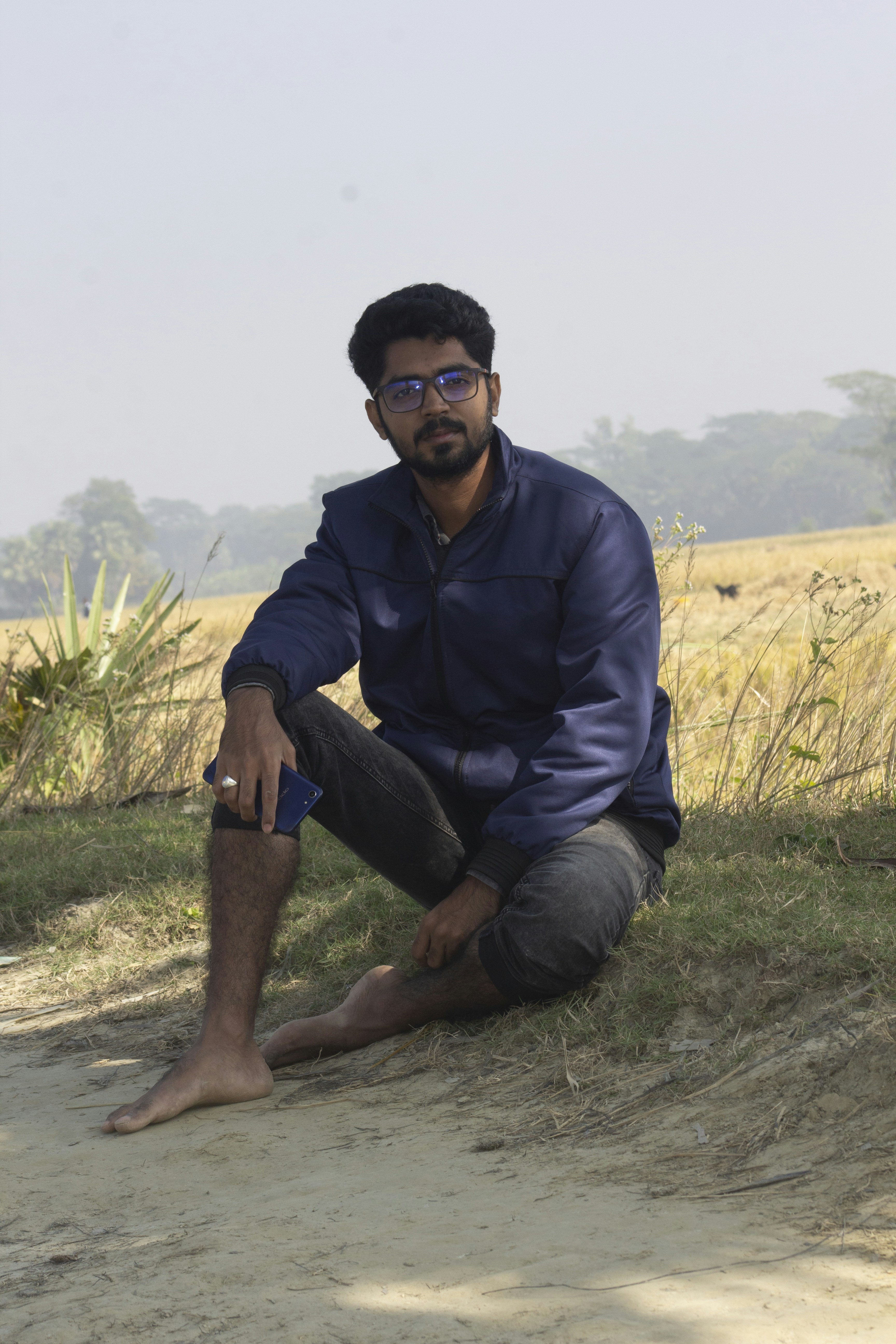 Solitary hours by the field: a relaxed portrait in late sun