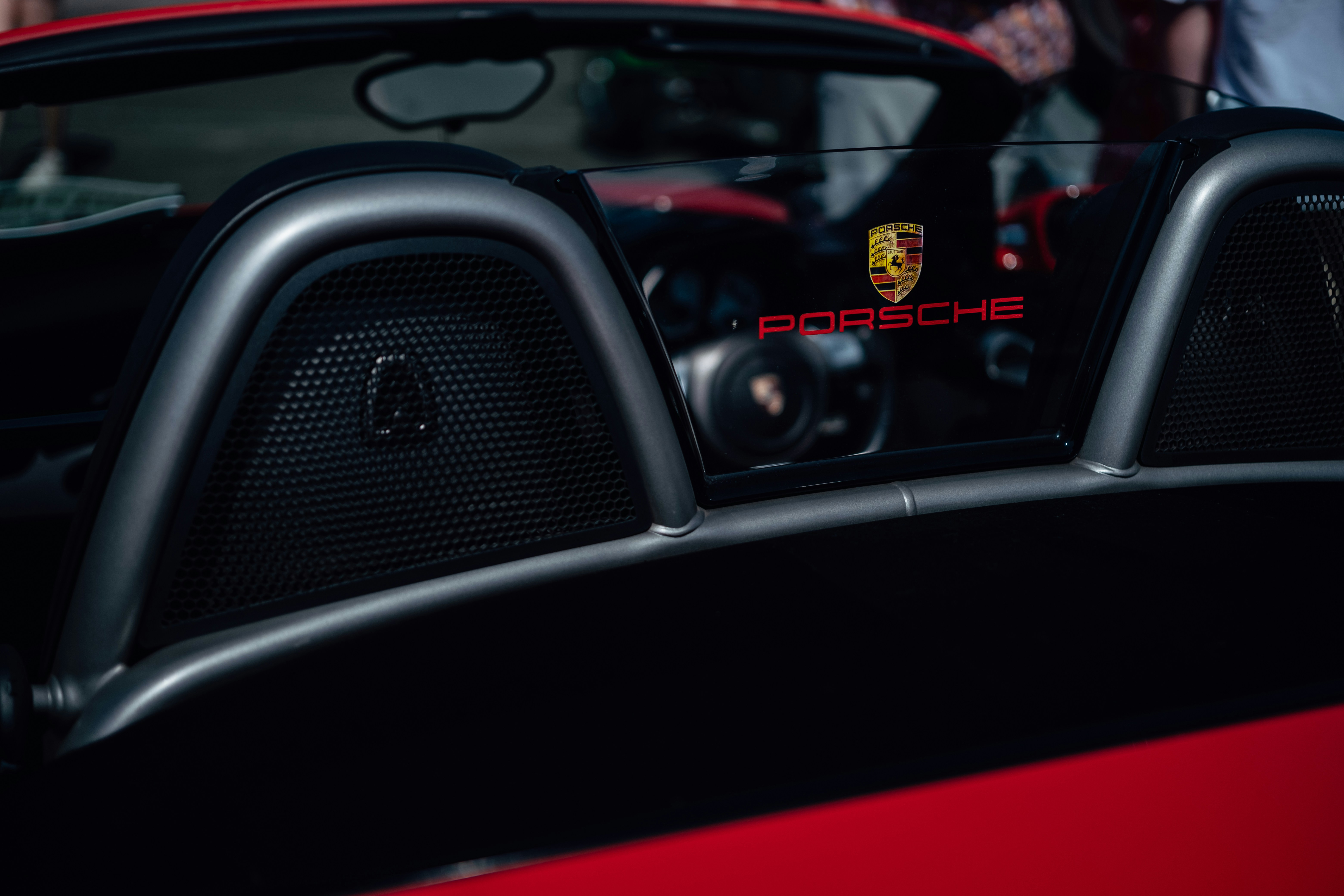 Porsche Emblem Reflections: A Close-Up on the Central Crest