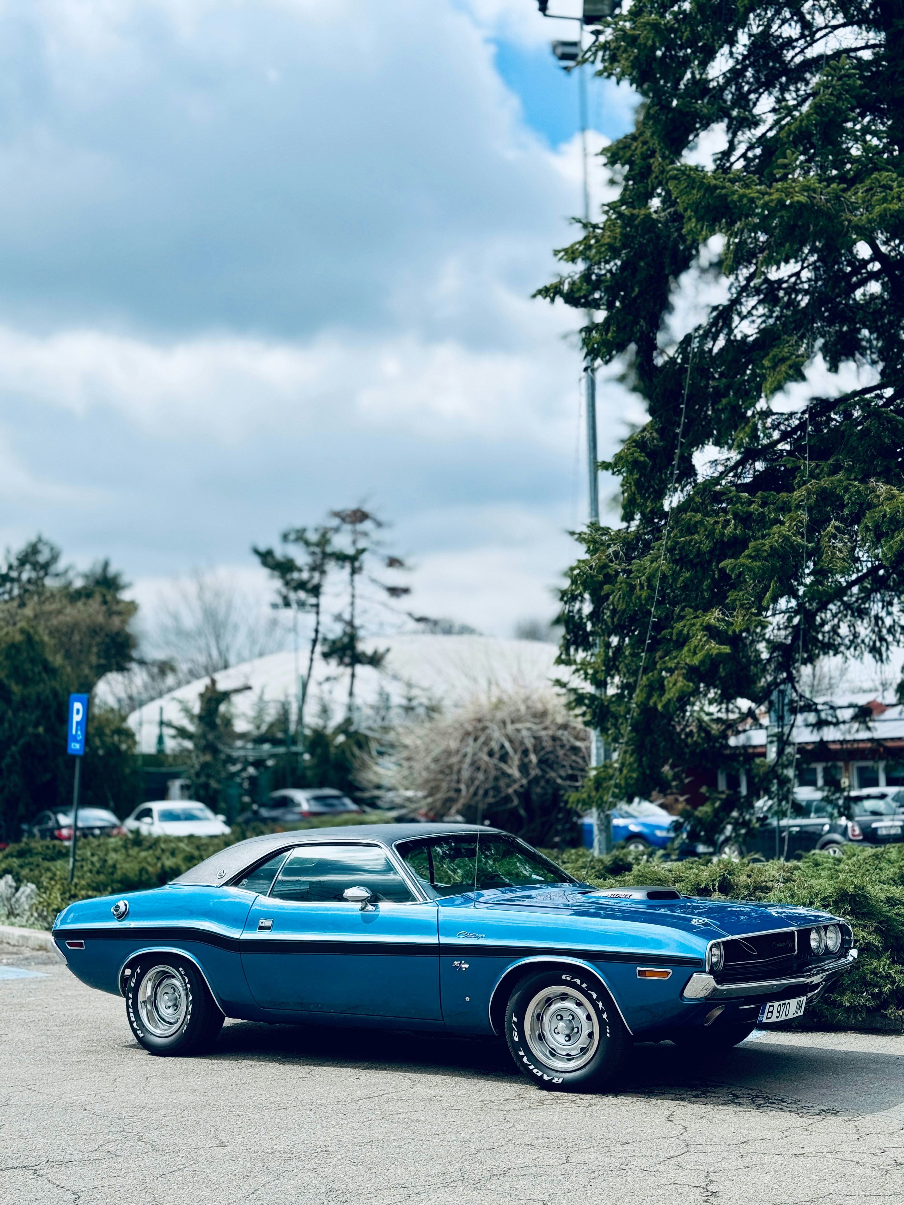 Blue Muscle Car in a Quiet Parking Lot
