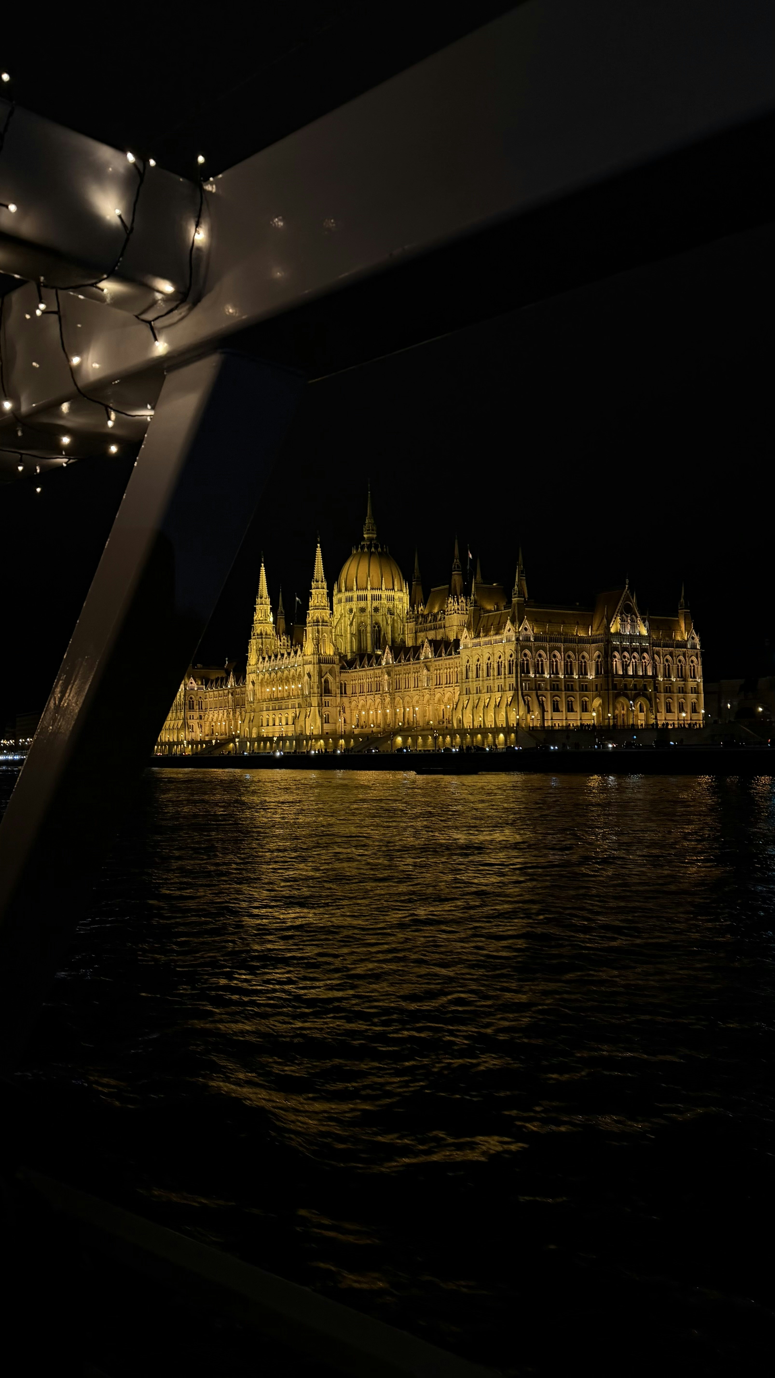 Golden Parliament Through a Boat Frame