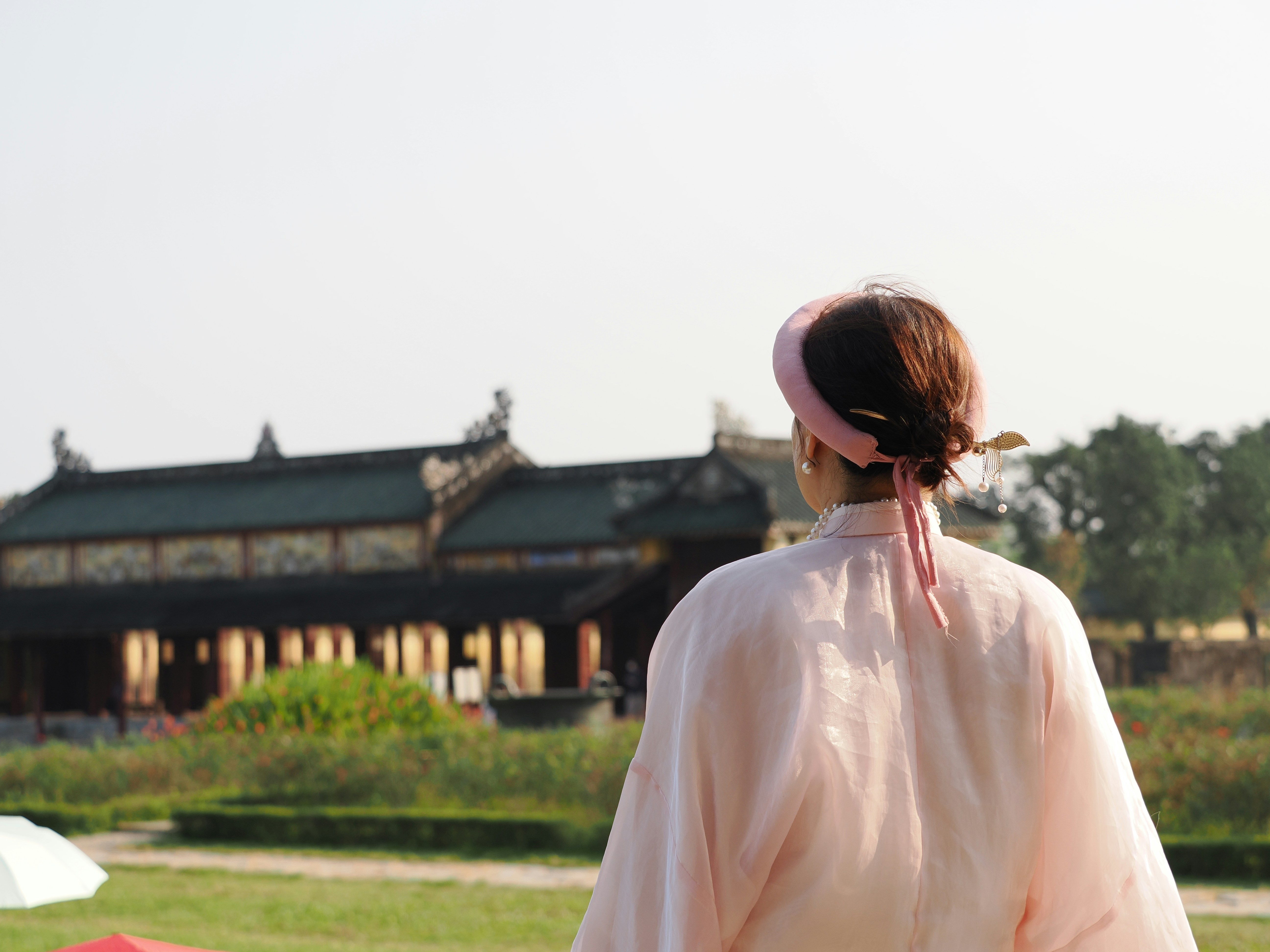 Softly Woven Attire at a Traditional Courtyard