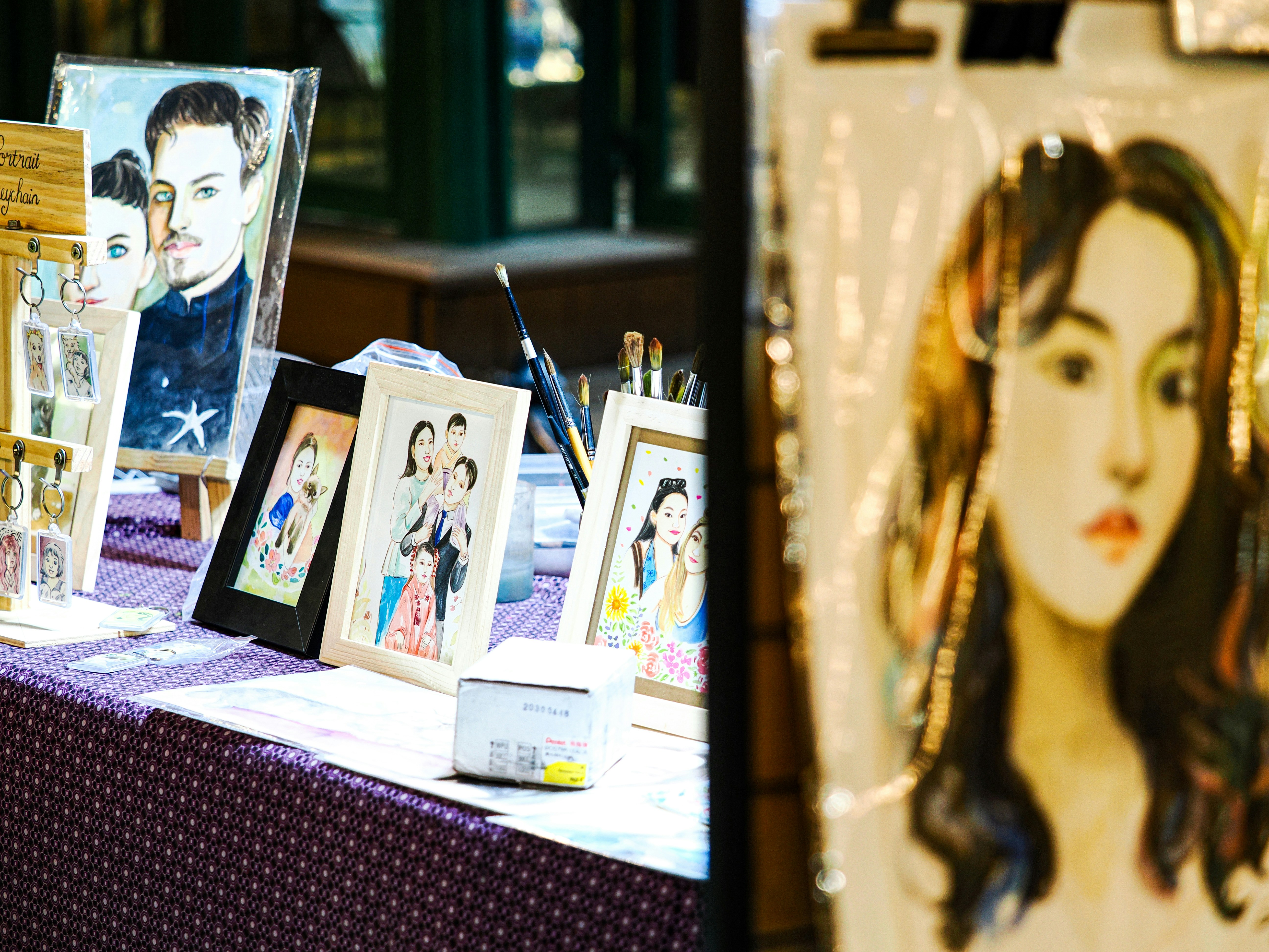 Portraits on Display: A Soon-to-Become Gallery Flash on a Street Stall
