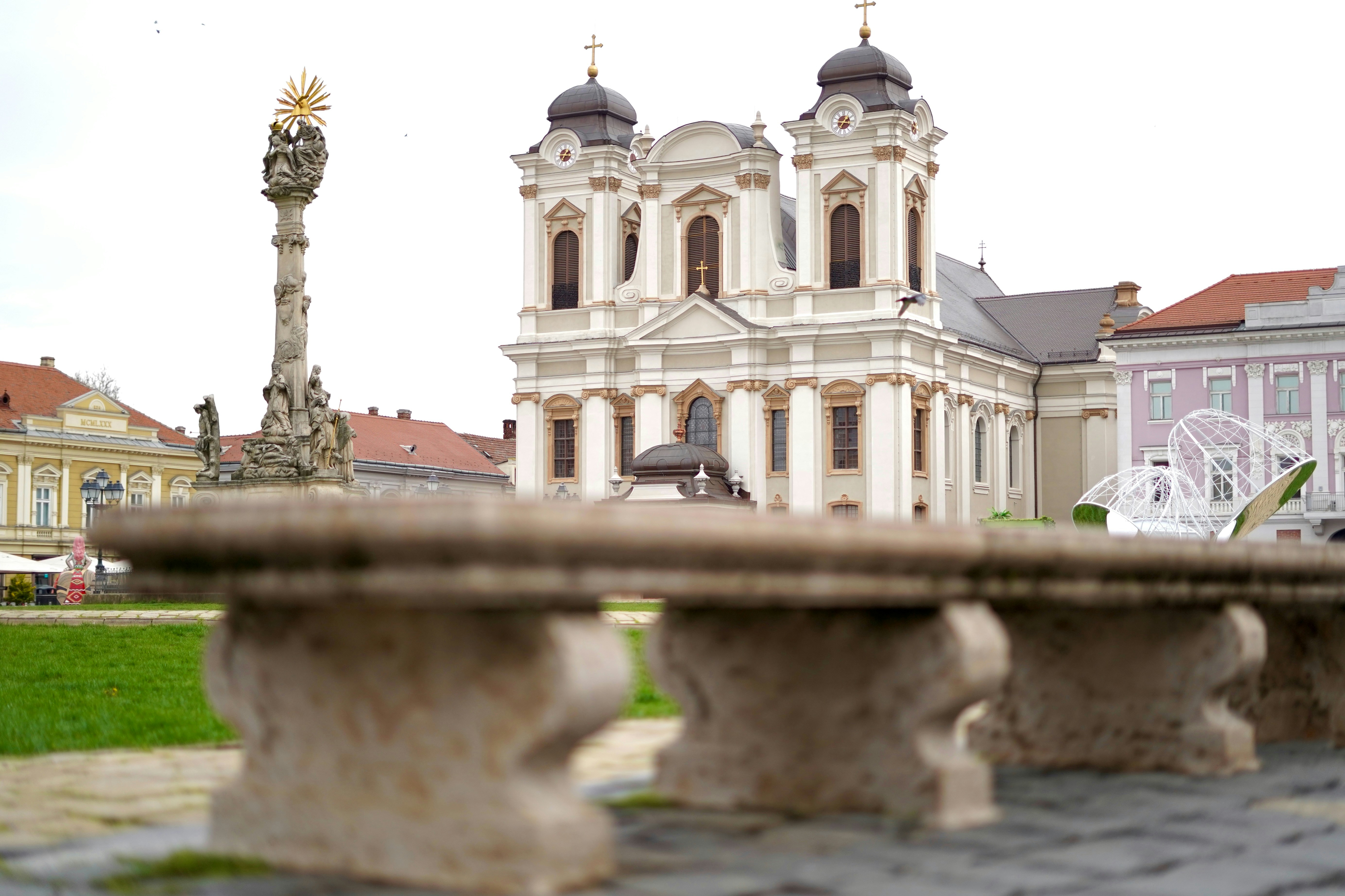 Baroque Church Rising Behind a Weathered Terrace