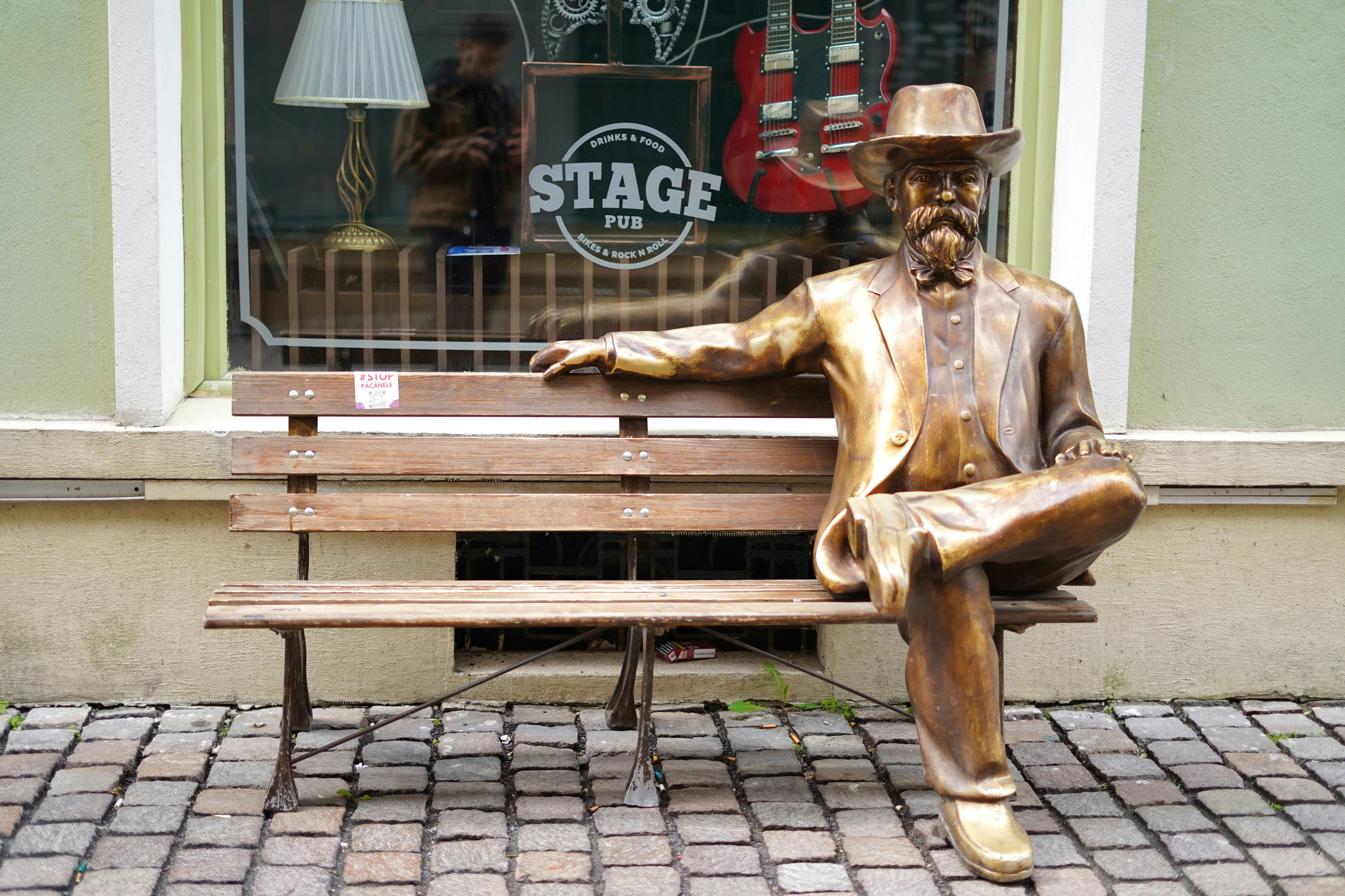 Bronze Stranger on a Bench: A City Sculpture in Quiet Conversation