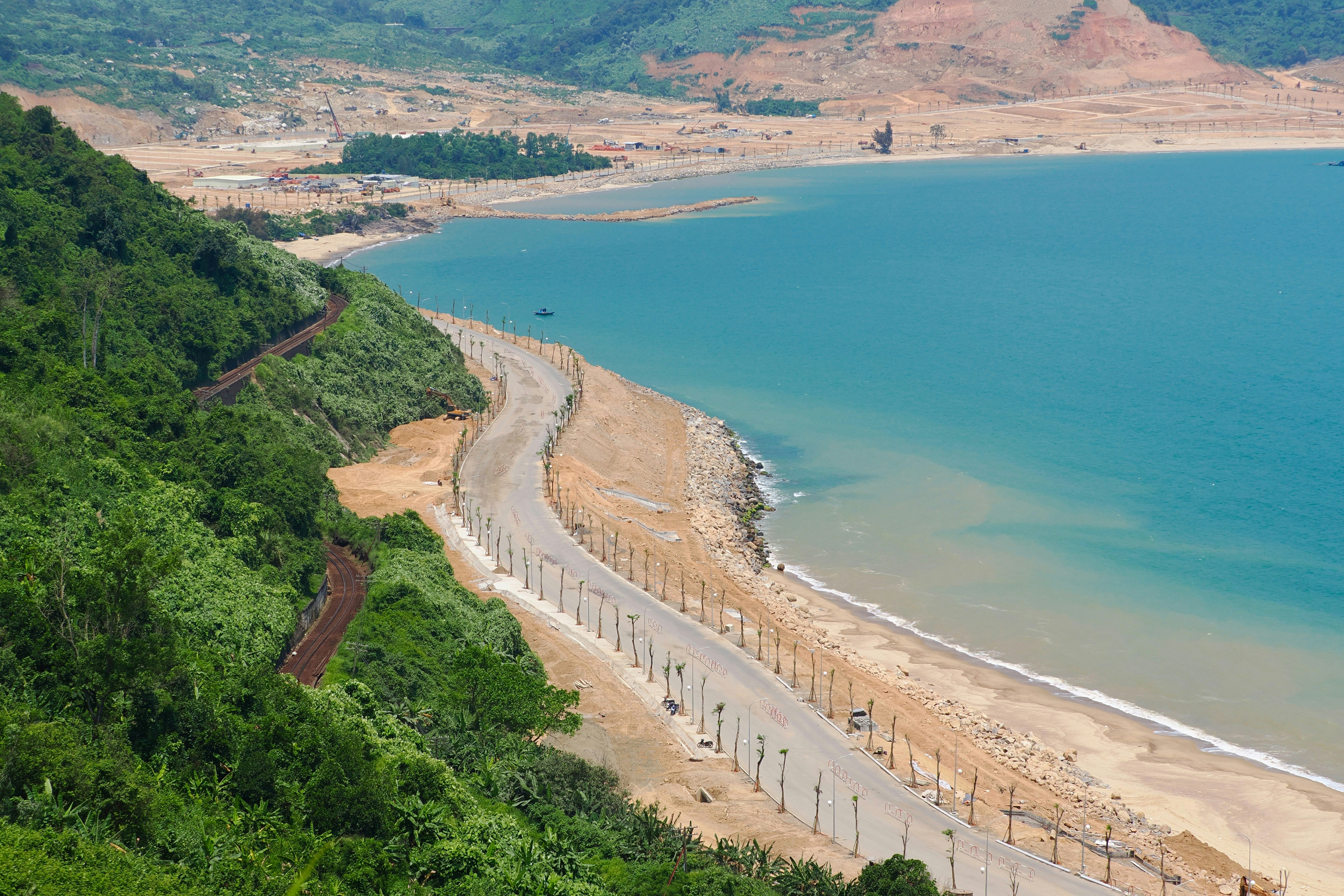 Coastal Road Tracing the Turquoise Shore