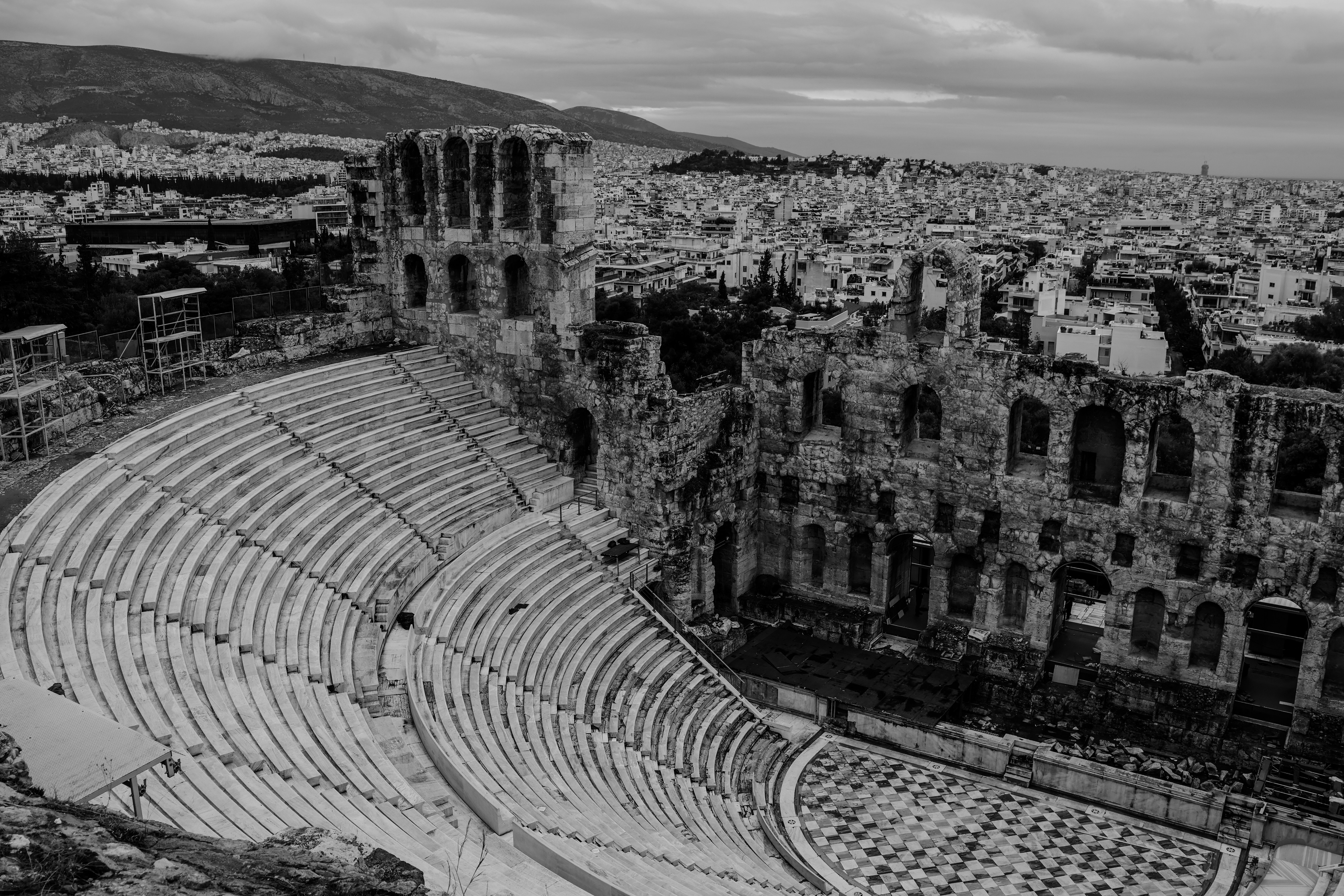 Rome’s Echo: Ancient Amphitheater Embraced by Overlooked Cityscape