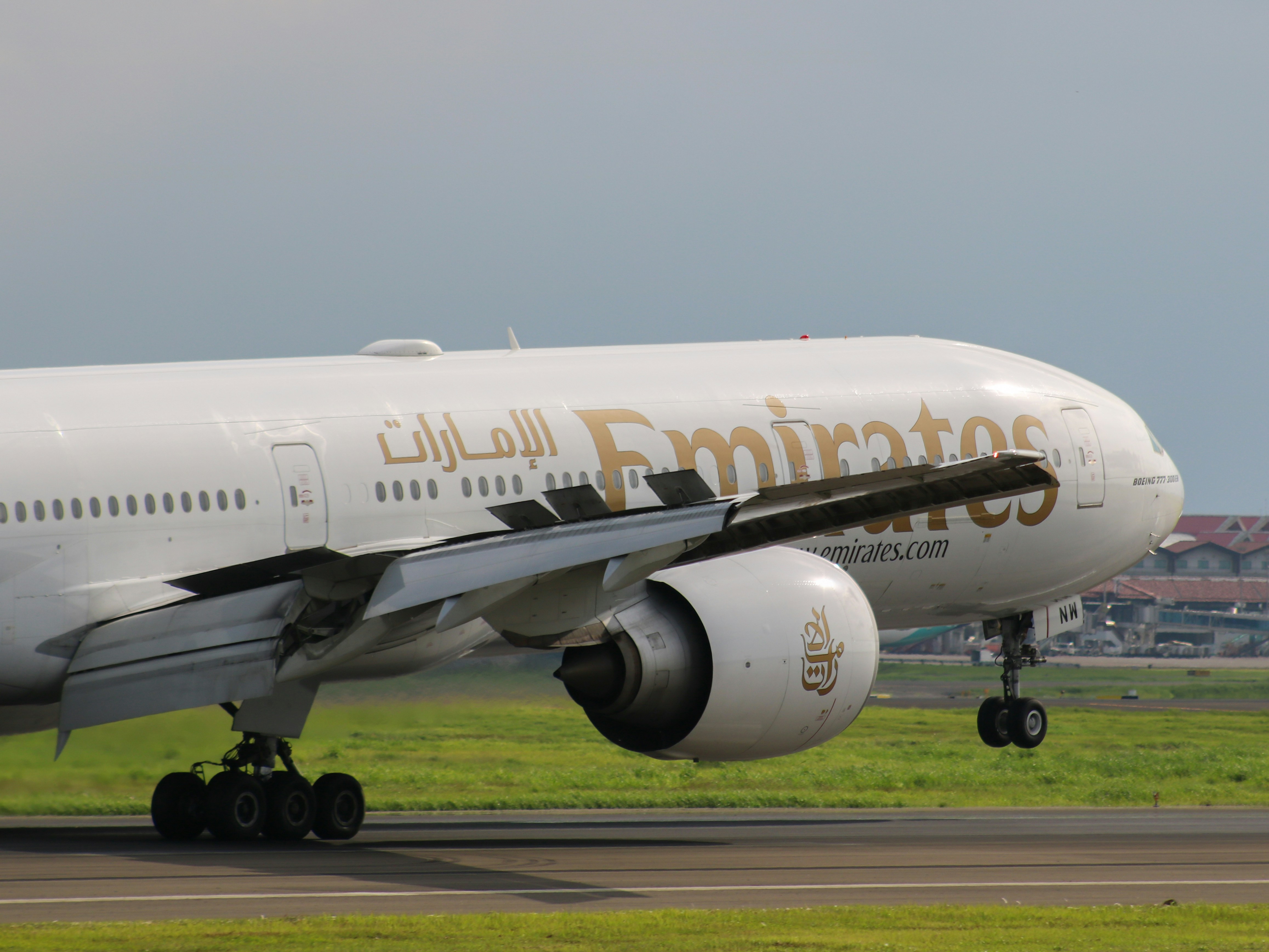 Emirates Dreamliner: Engine, Wing, and Tarmac in Focus