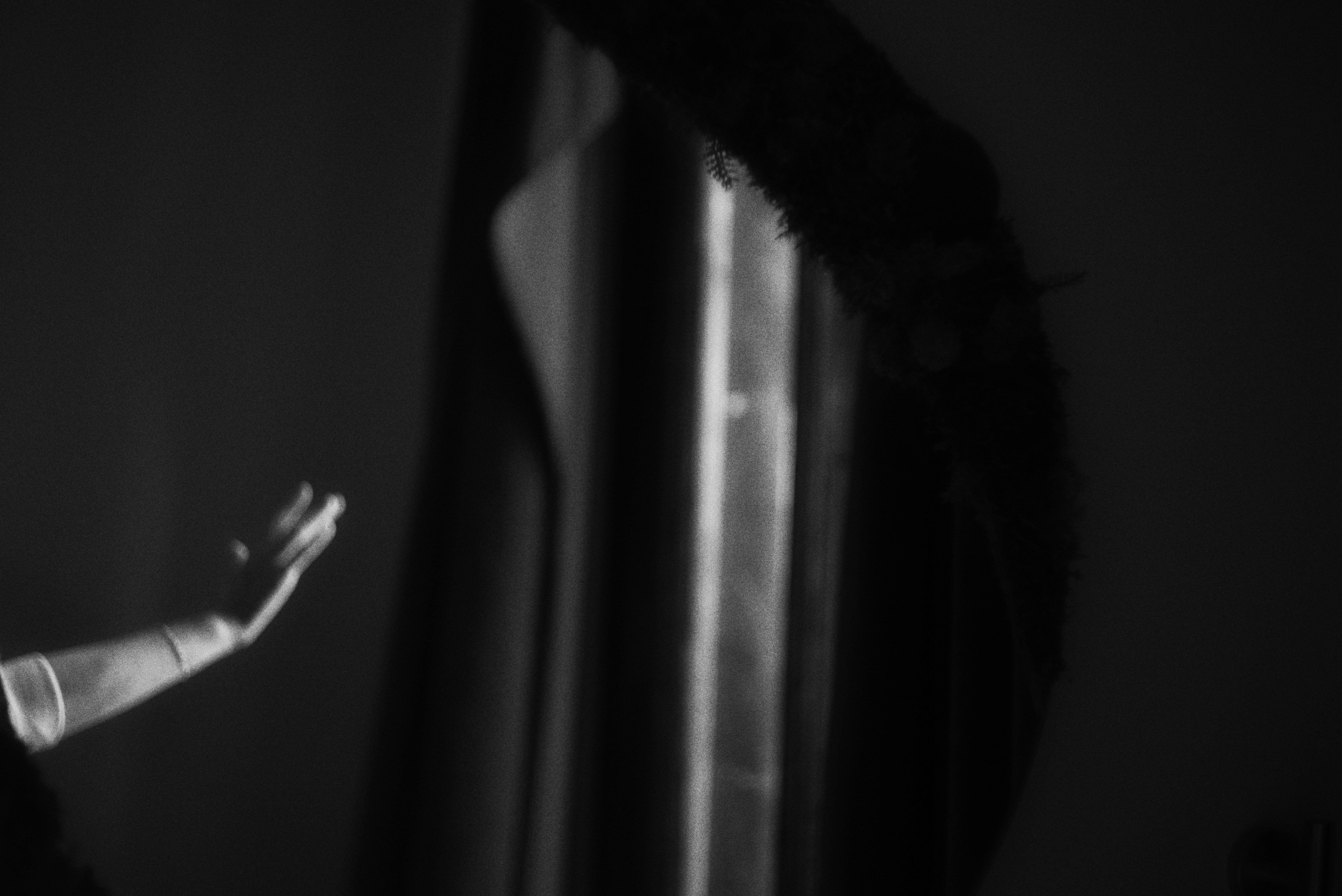 First Contact with the Curtain: A Wandering Hand in Quiet Light